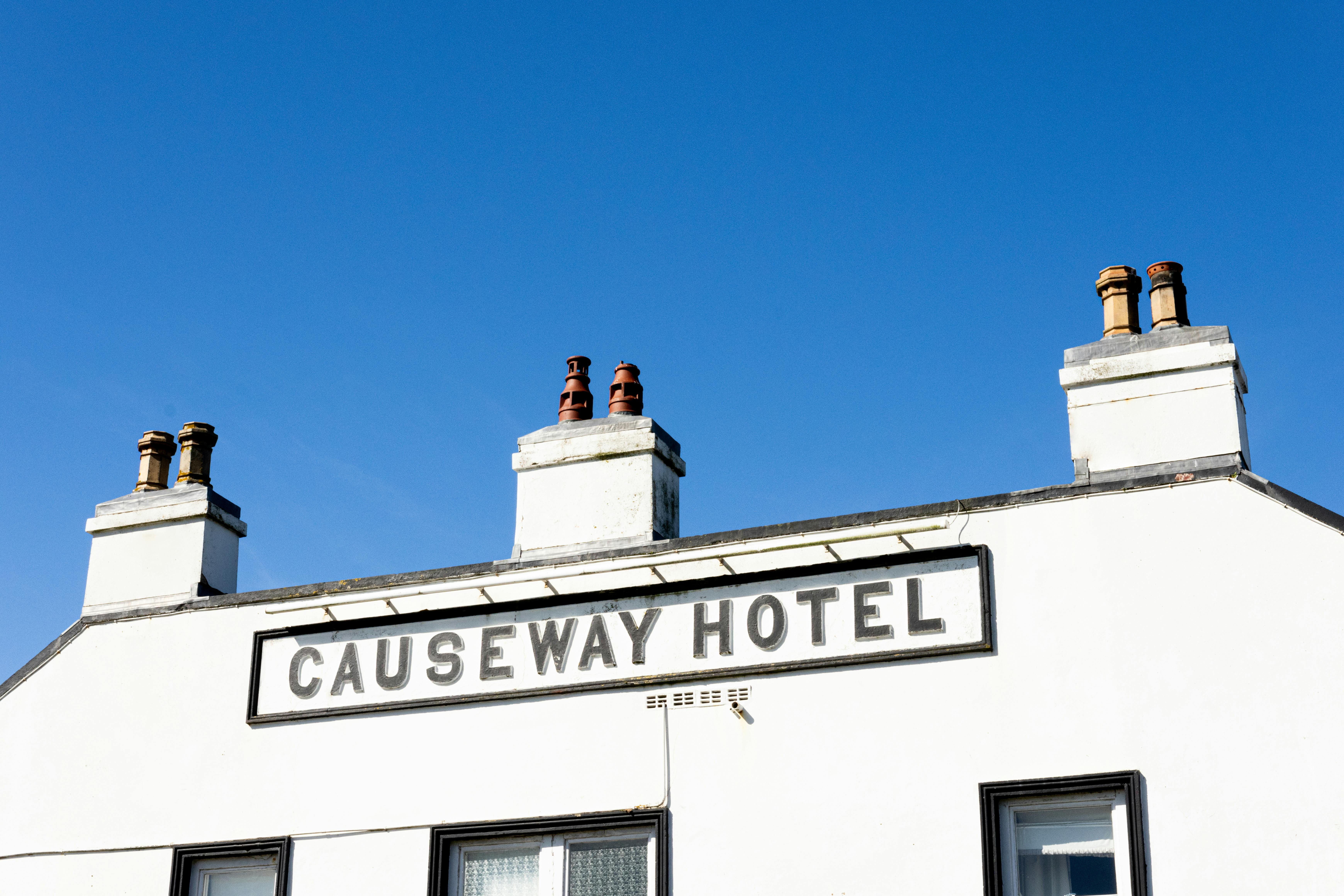 Causeway Hotel in Northern Ireland against Blue Sky · Free Stock Photo