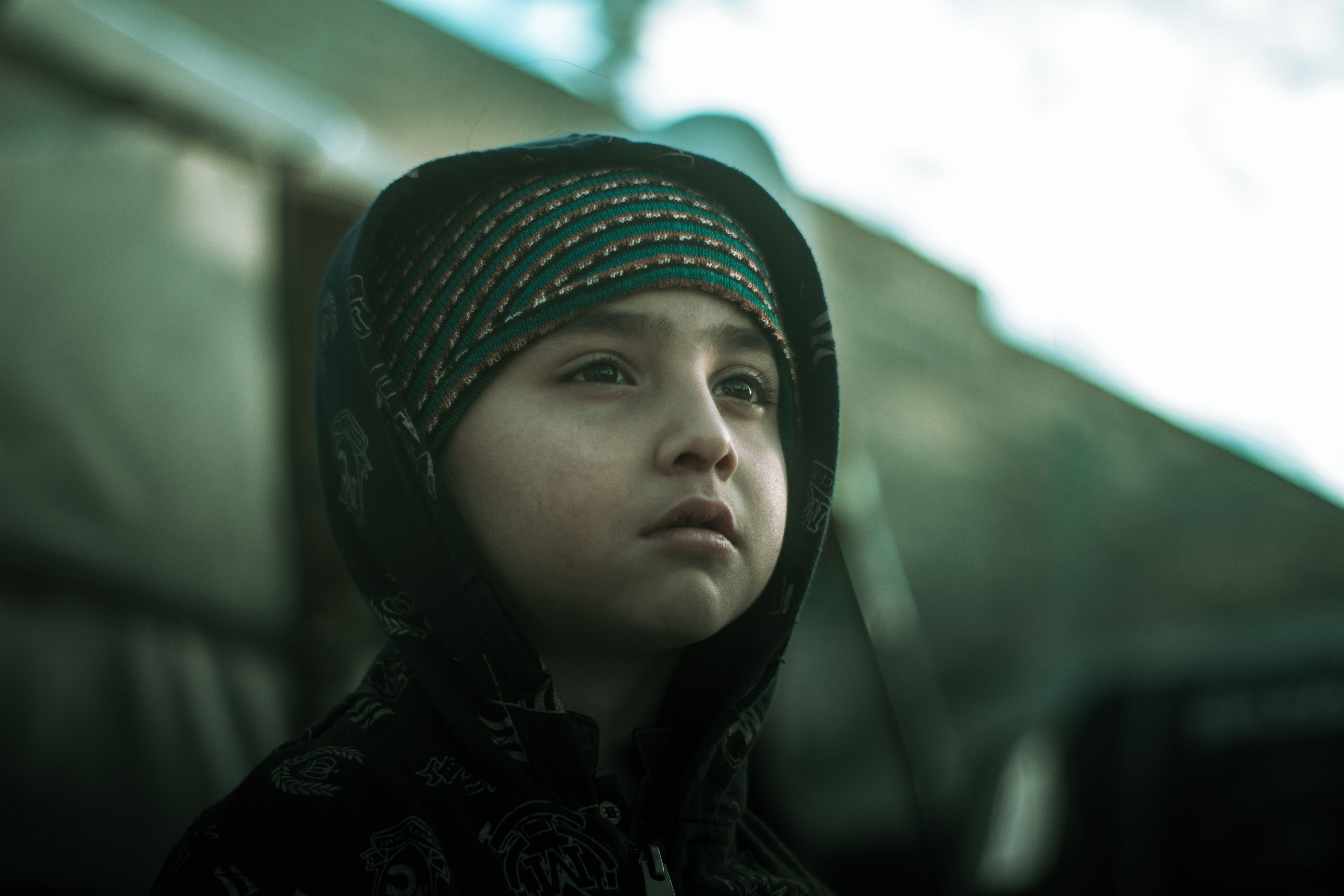Portrait of a Thoughtful Child in Pakistani Street Style · Free Stock Photo