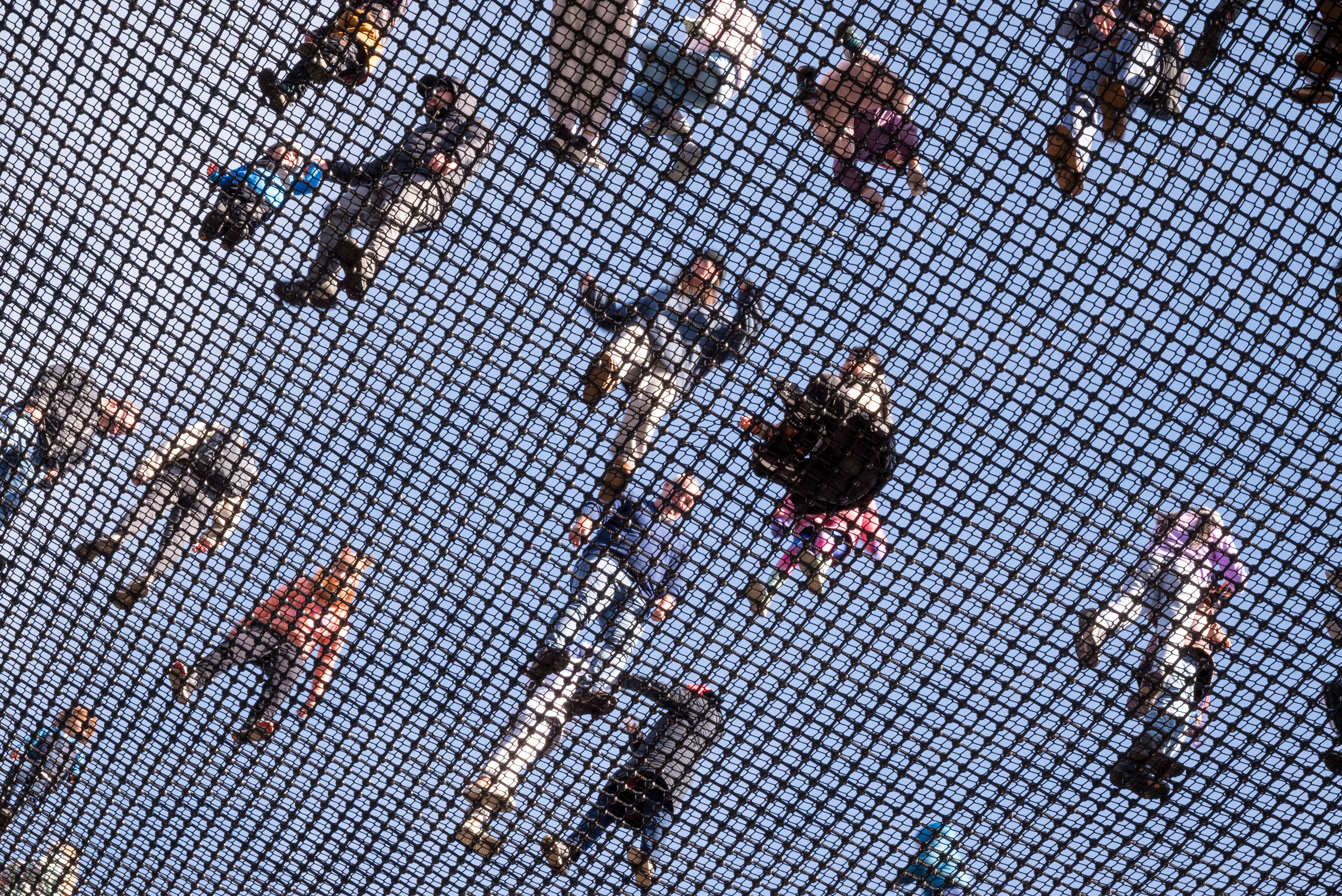People Enjoying Trampoline Experience from Below · Free Stock Photo