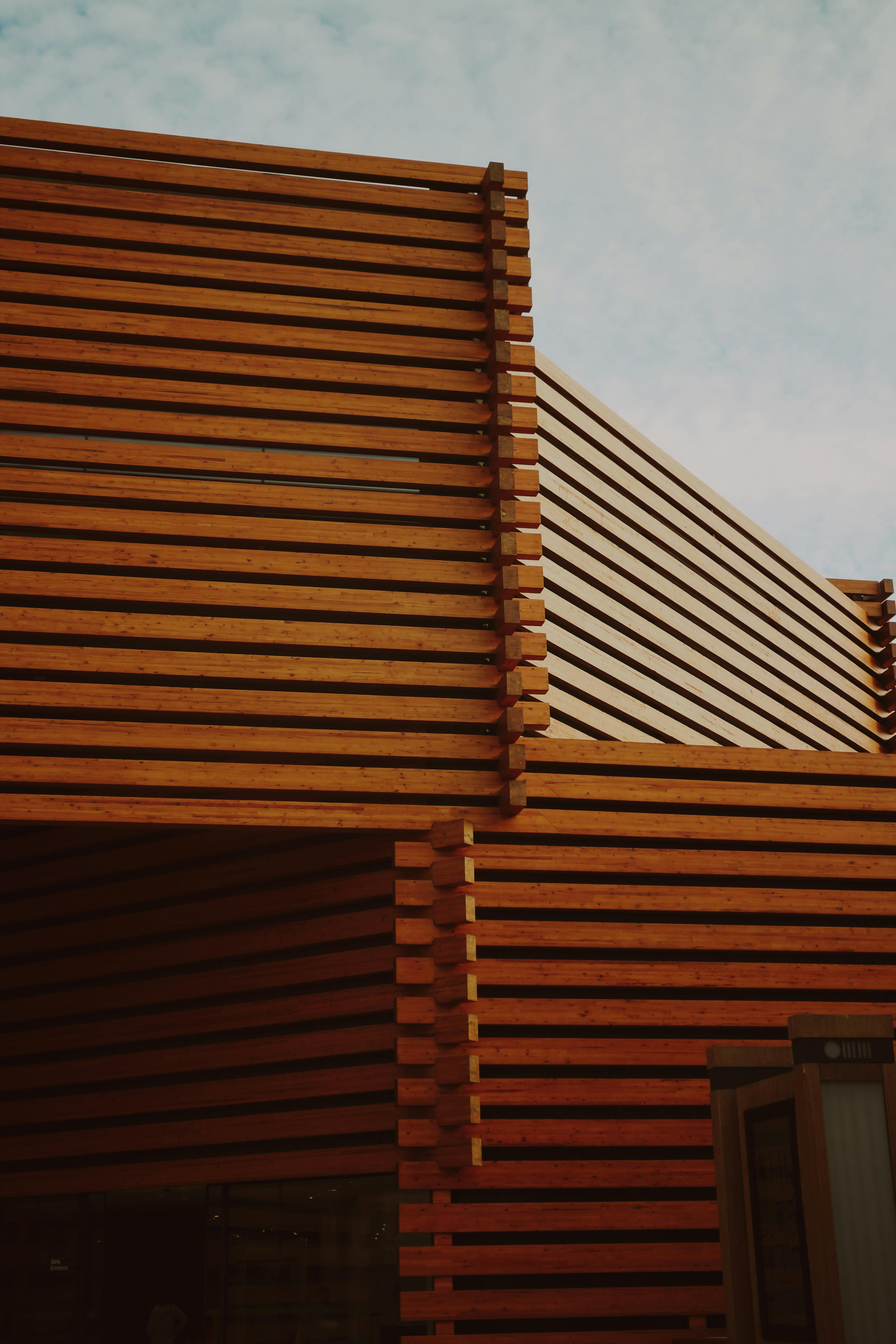 Modern Wooden Architectural Design with Sky View · Free Stock Photo