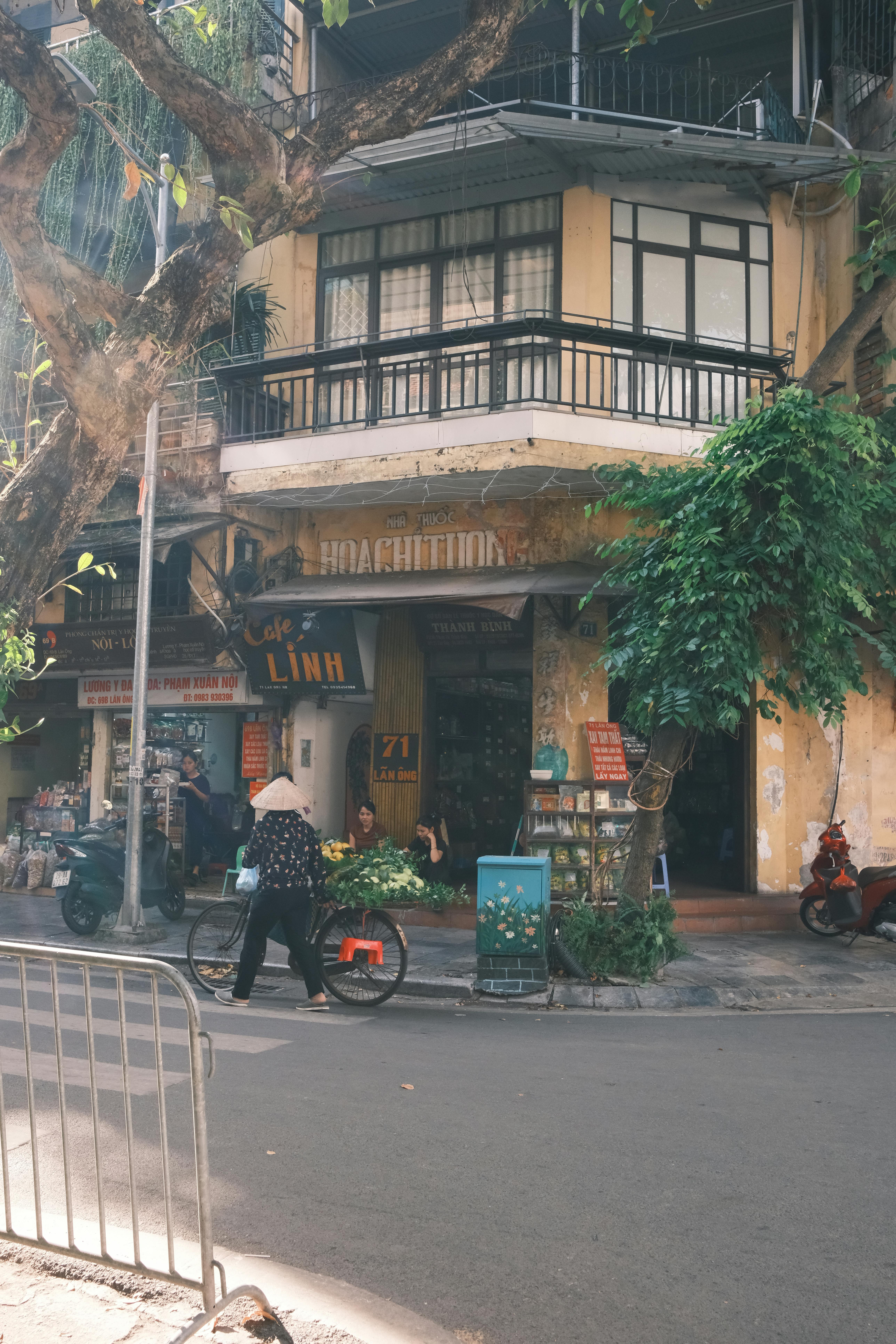 Street View of a Quaint Café in Hanoi, Vietnam · Free Stock Photo