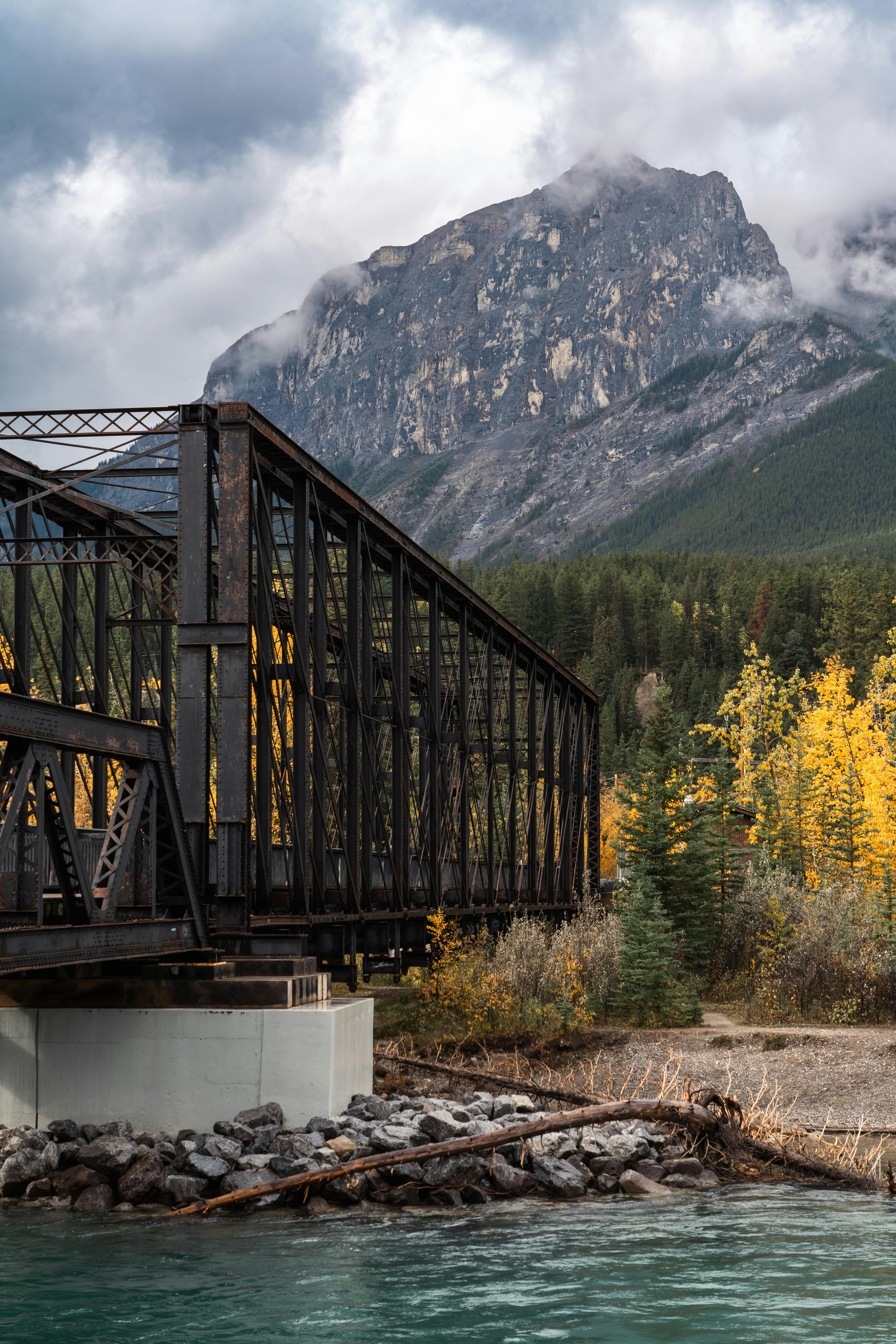 Scenic Autumn View of a Metal Bridge in Banff · Free Stock Photo