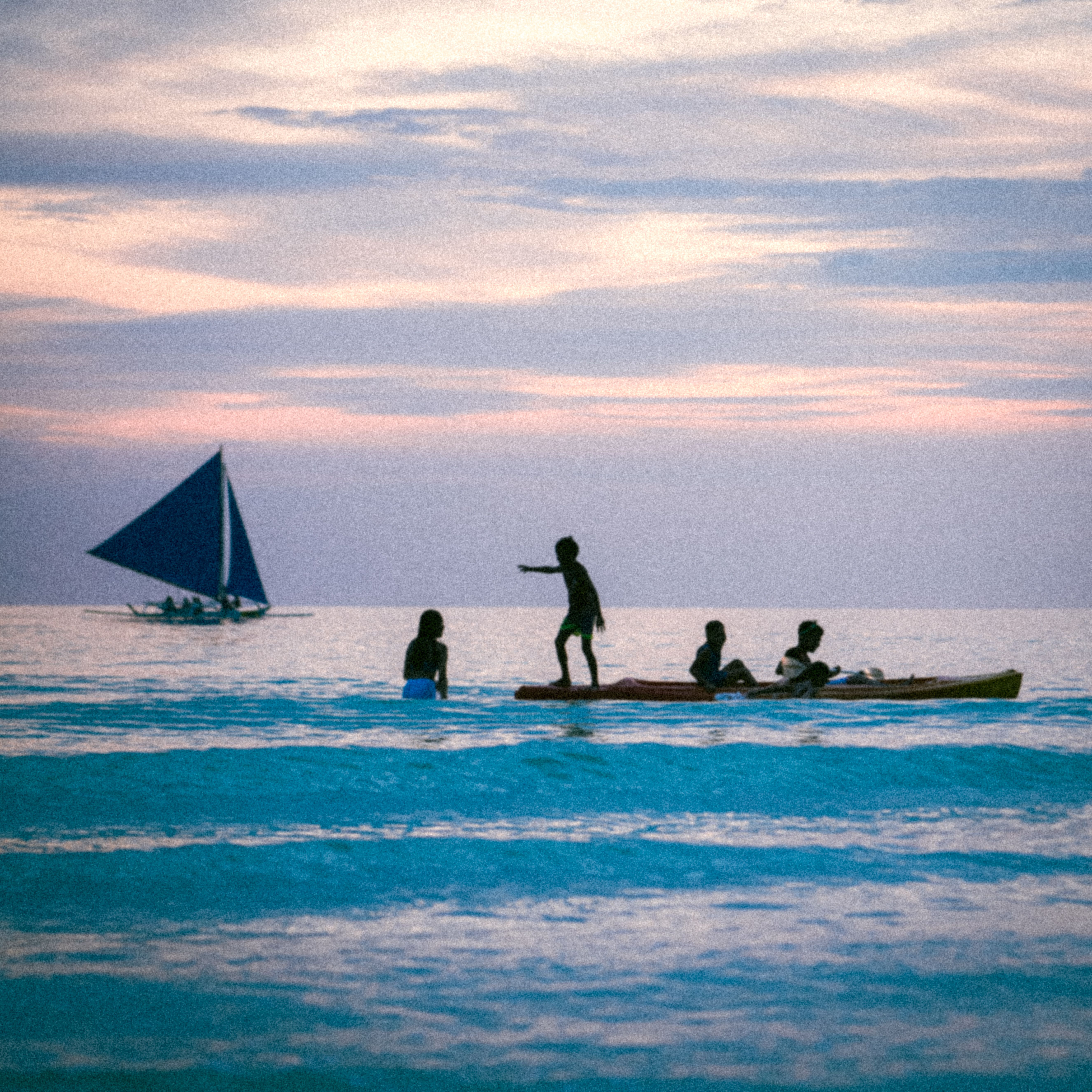 Children Canoeing at Sunset on a Tropical Beach · Free Stock Photo