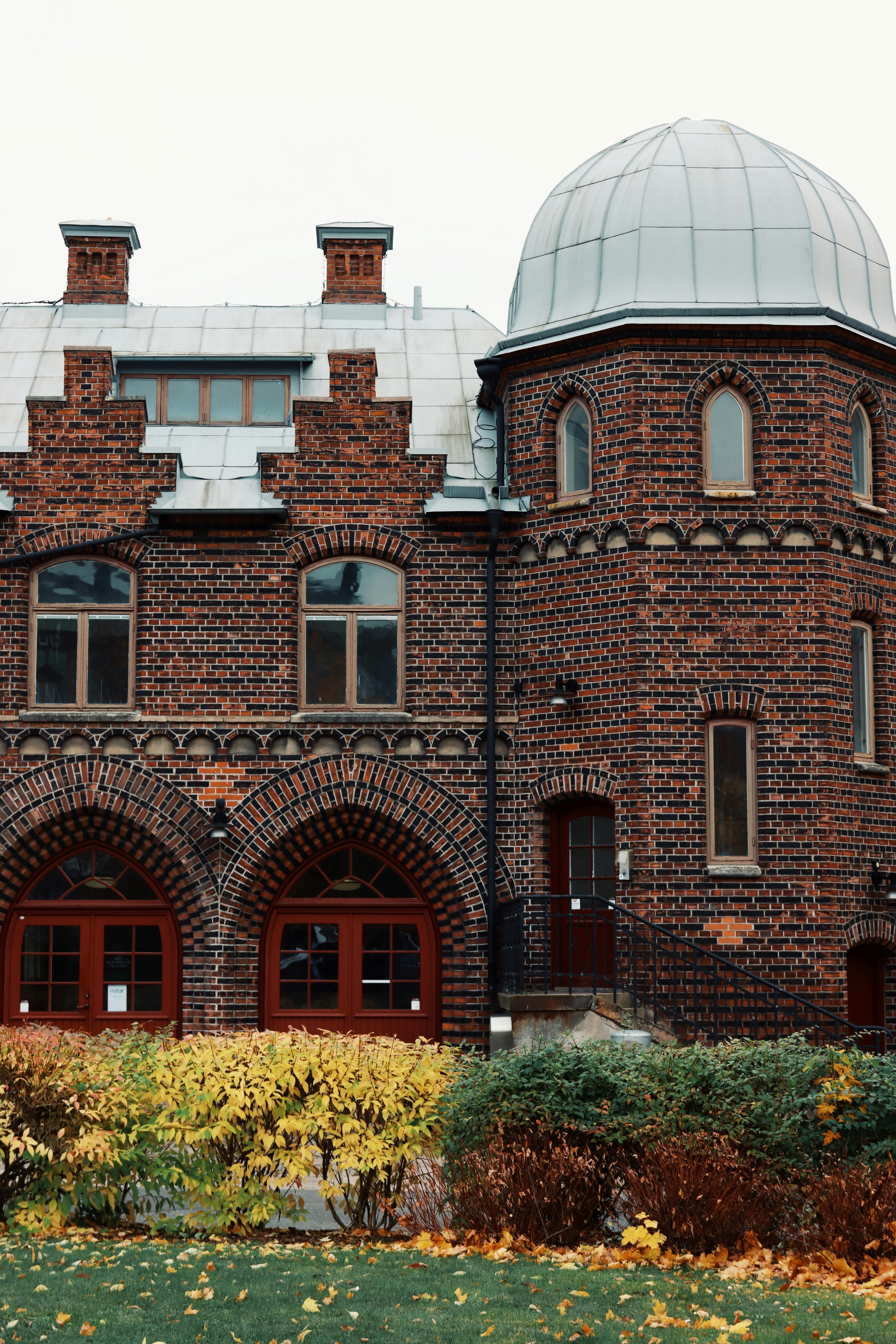 Historic Nordic Brick Building with Dome Roof · Free Stock Photo