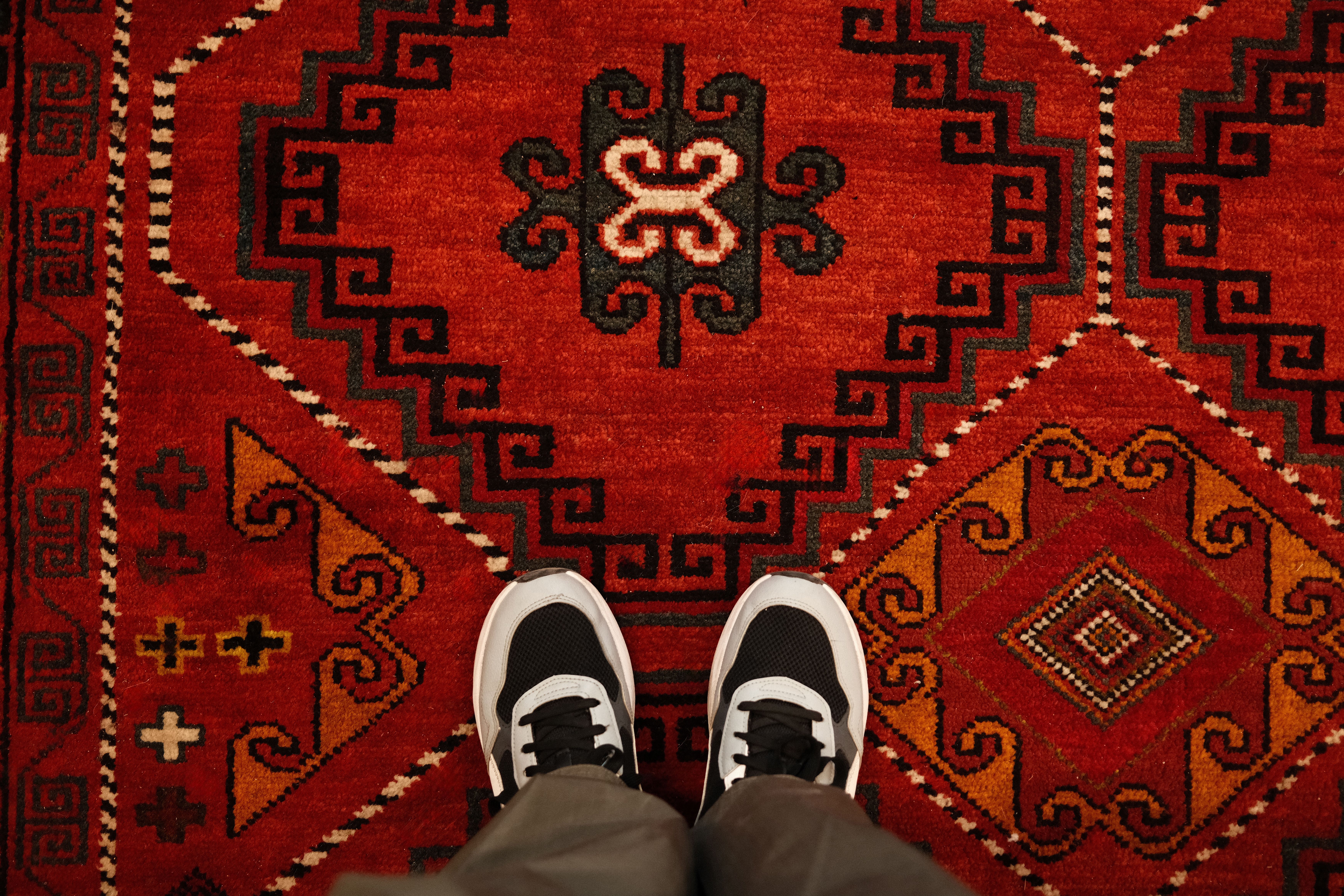 Traditional Red Carpet with Sneakers in Kazakhstan · Free Stock Photo