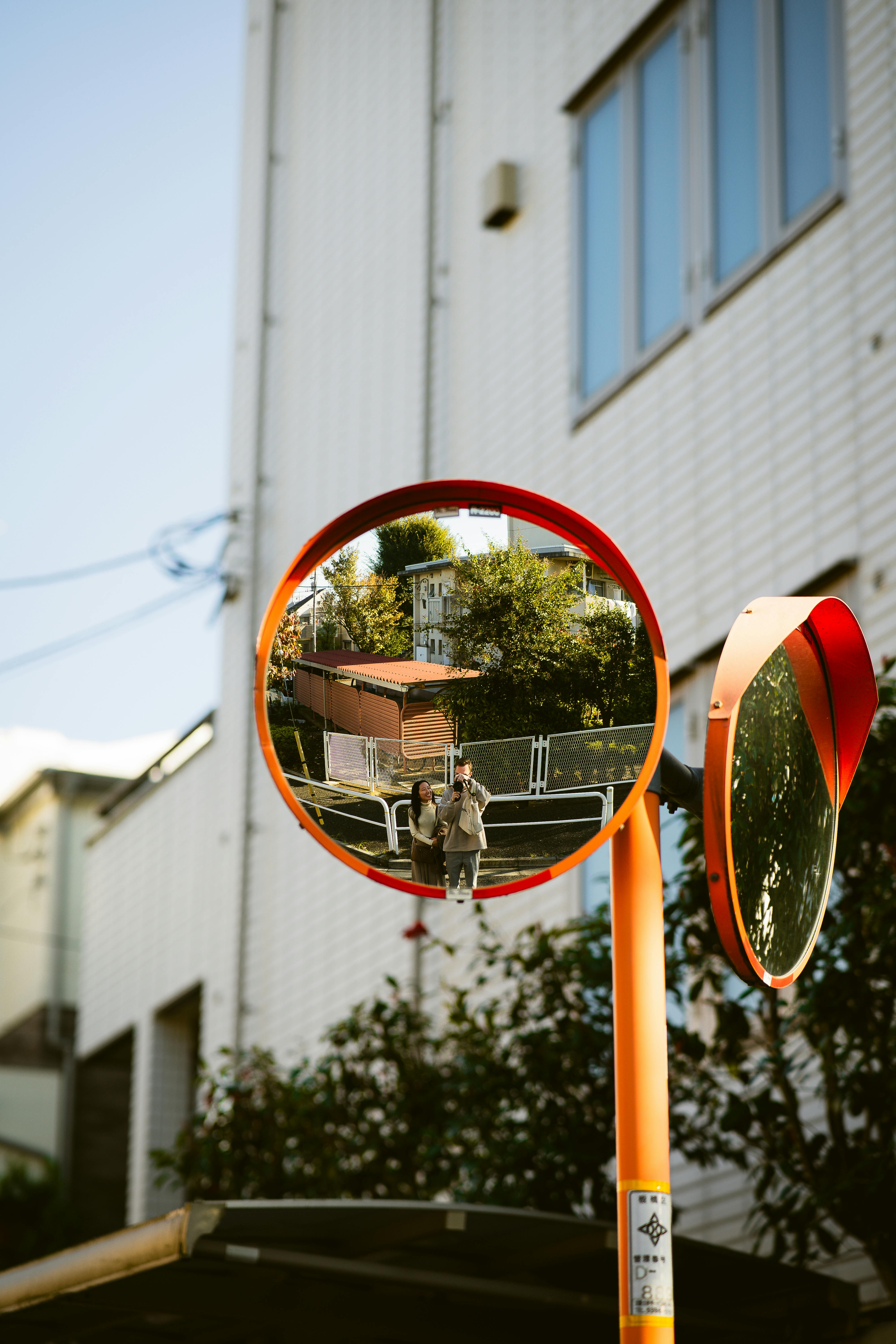 Urban Reflection in Tokyo Circular Mirror · Free Stock Photo