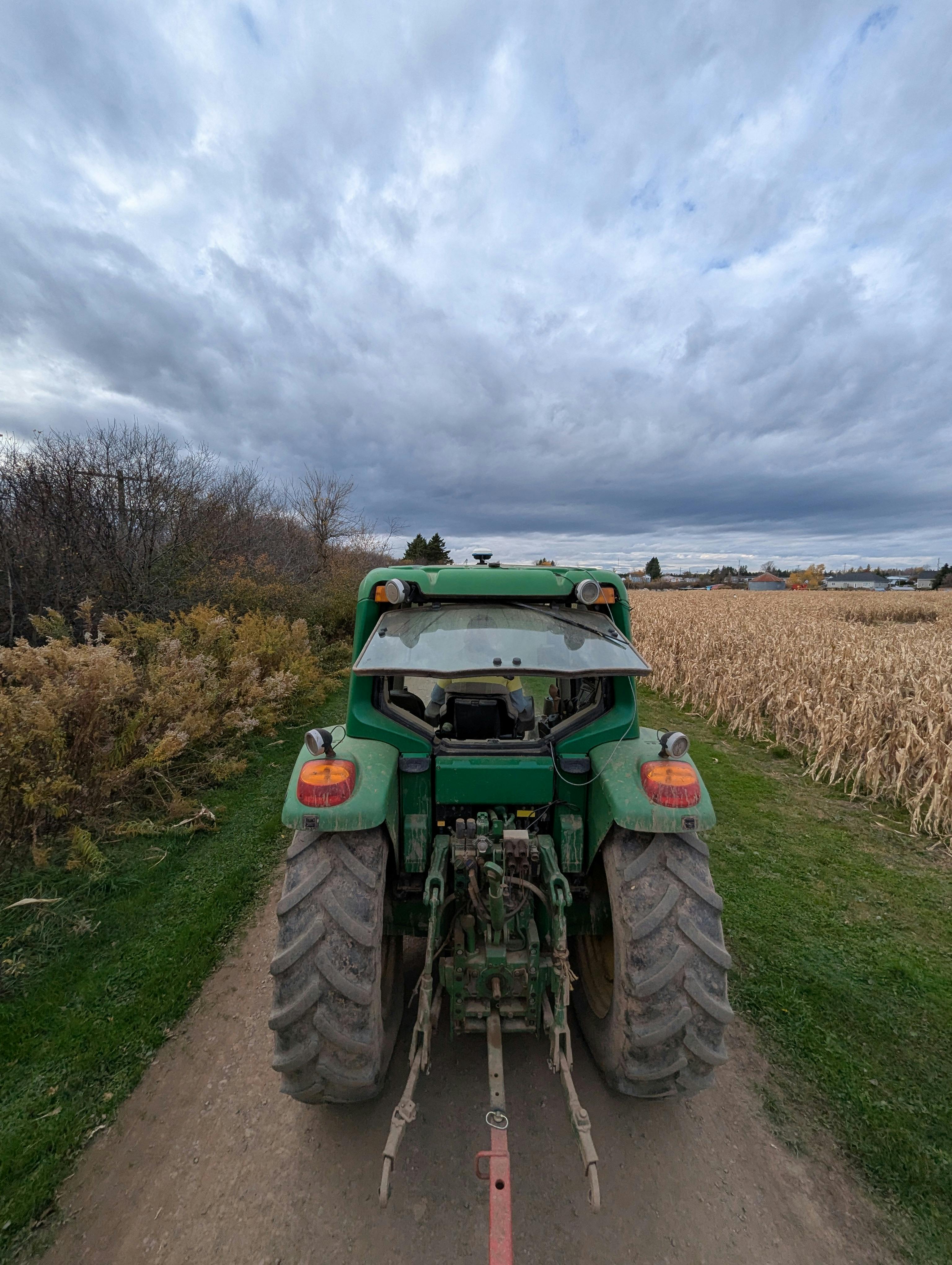 Classic Green Tractor in Truro Farm Scene · Free Stock Photo