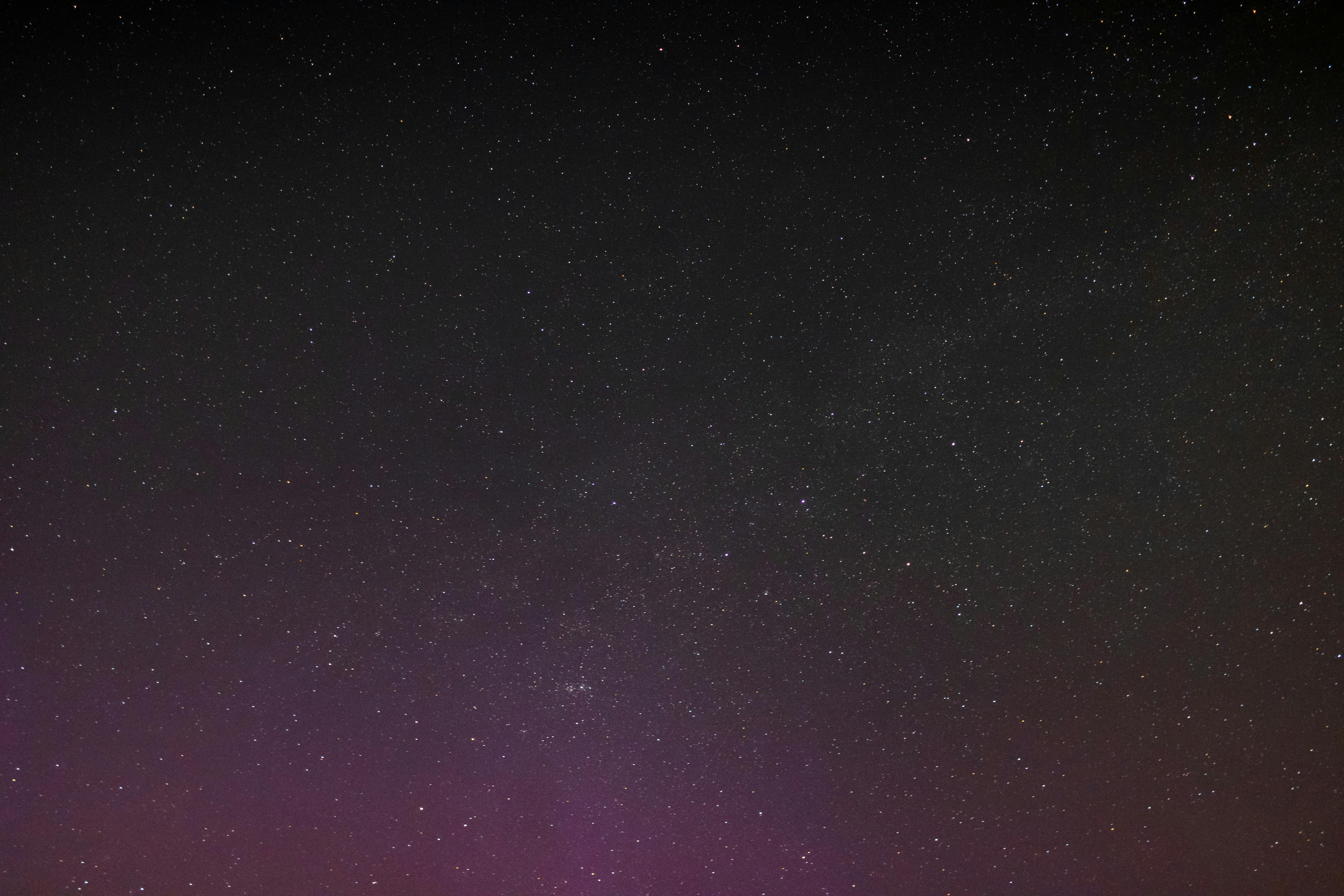 Starry Night Sky with Subtle Aurora Glow · Free Stock Photo