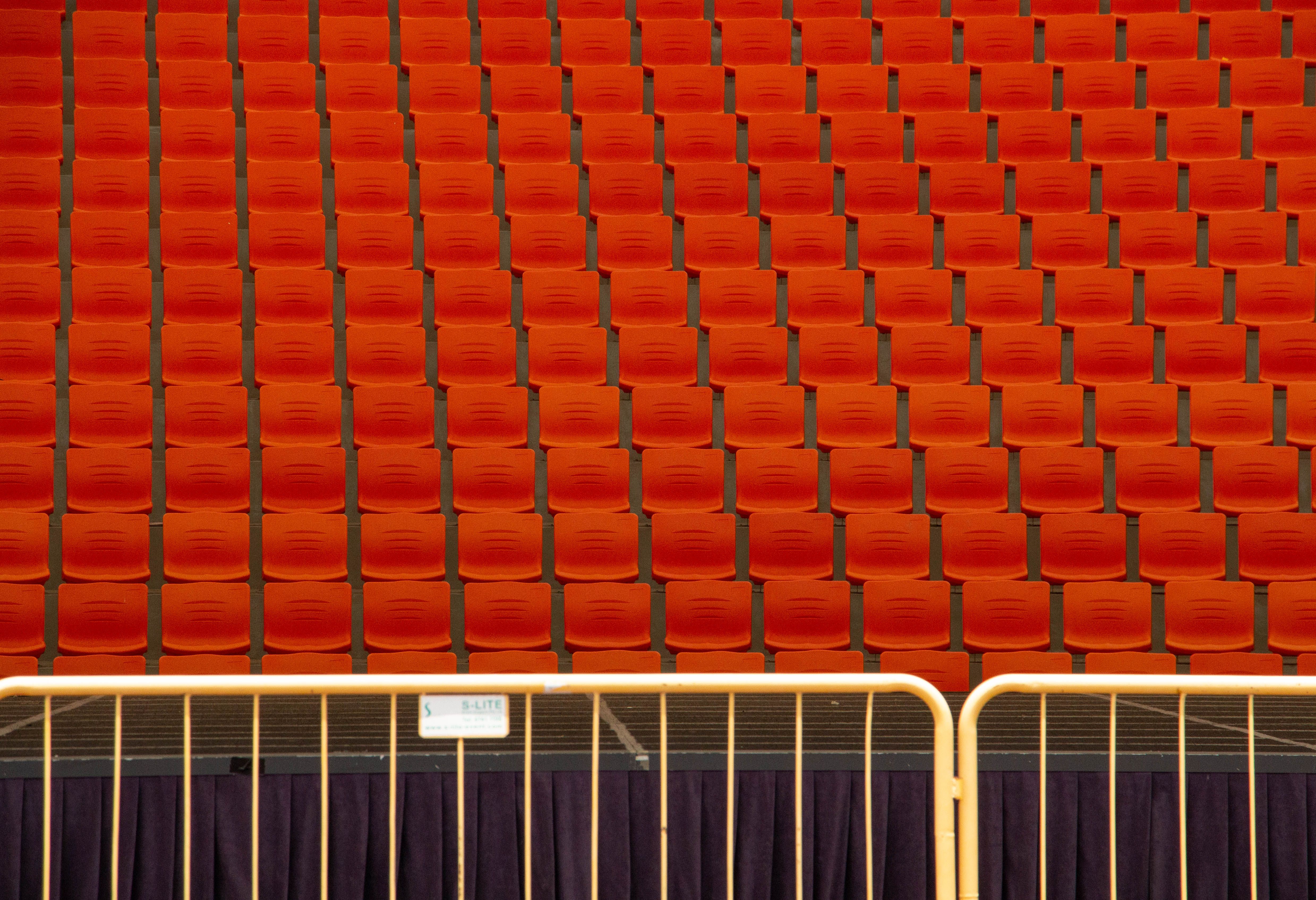 Patterned Red Seating in Modern Auditorium · Free Stock Photo