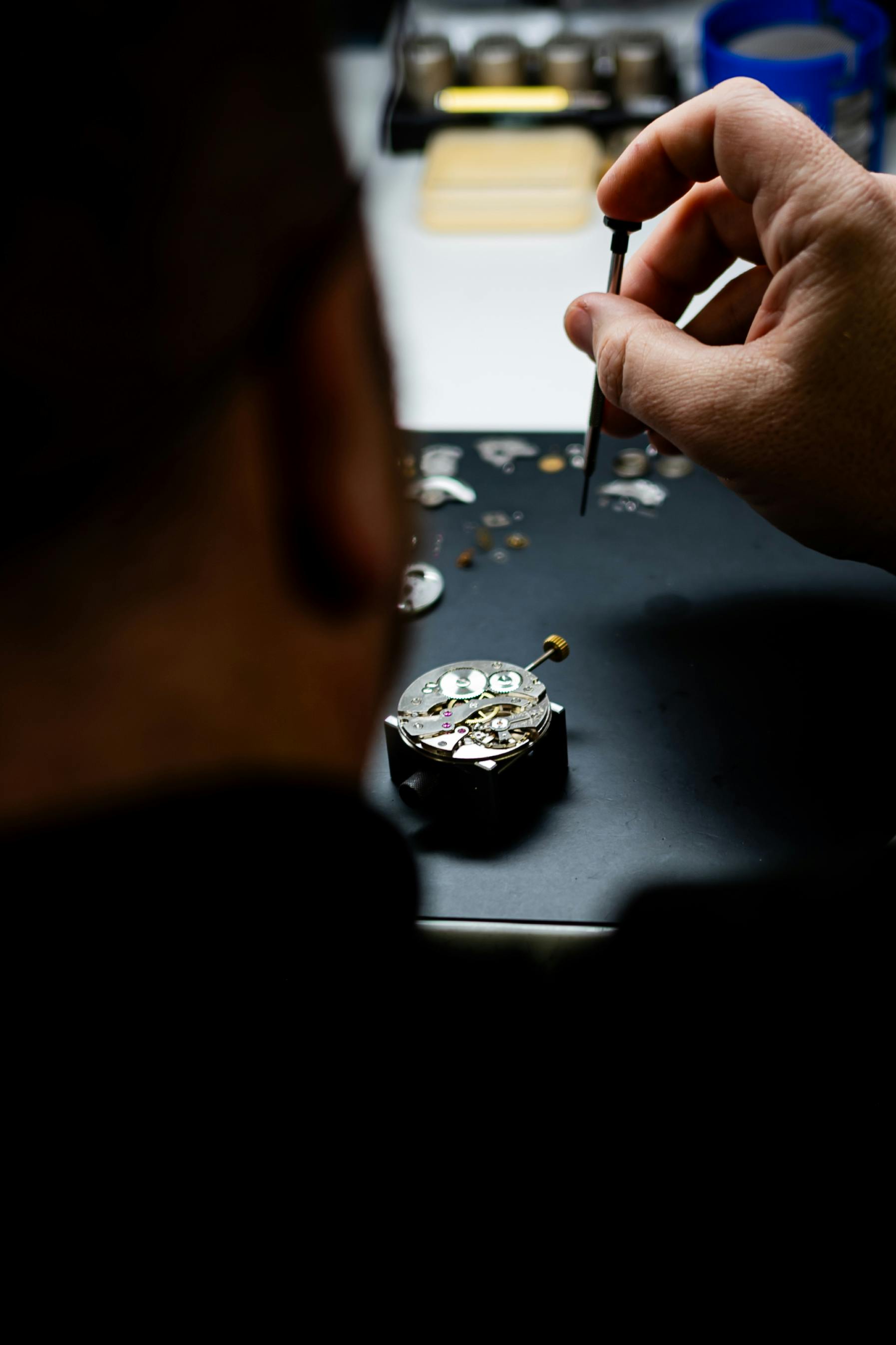 Watchmaker Assembling a Timepiece with Precision · Free Stock Photo