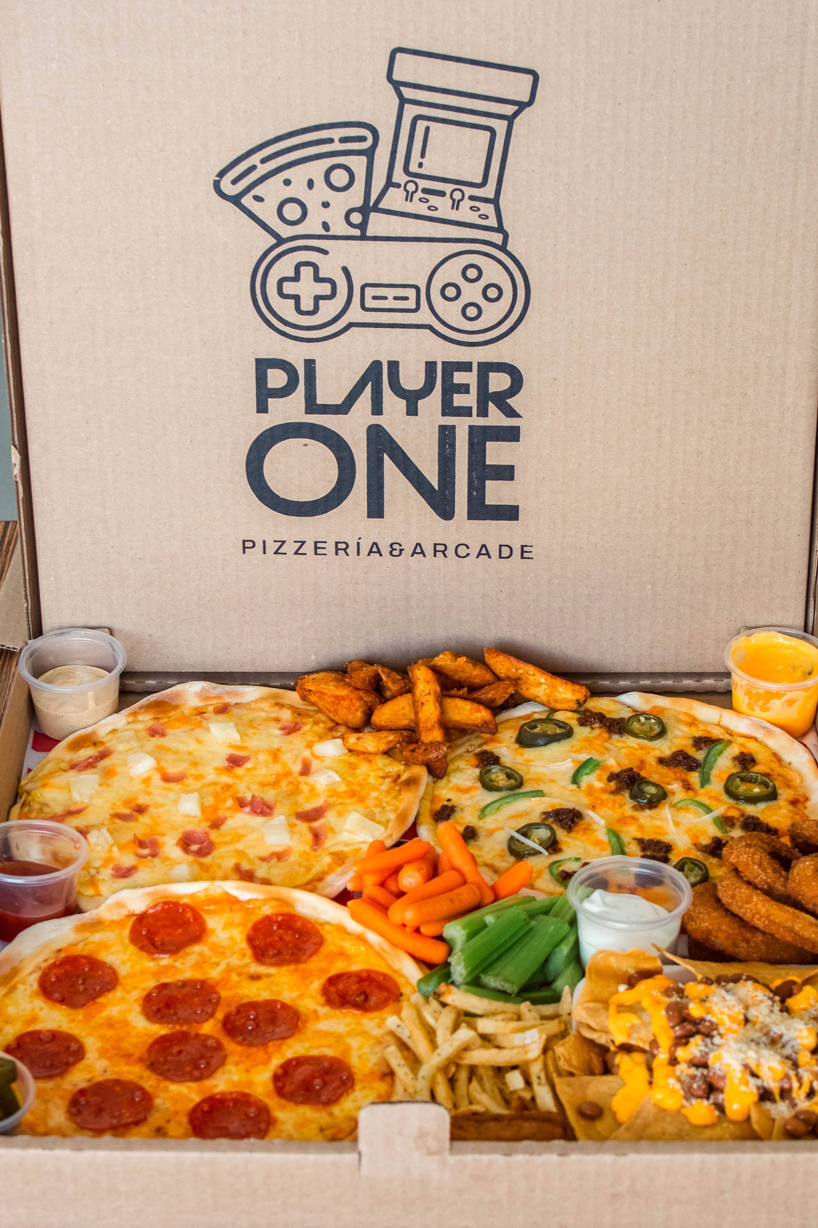 Gamer-Themed Pizza Box with Assorted Appetizers · Free Stock Photo