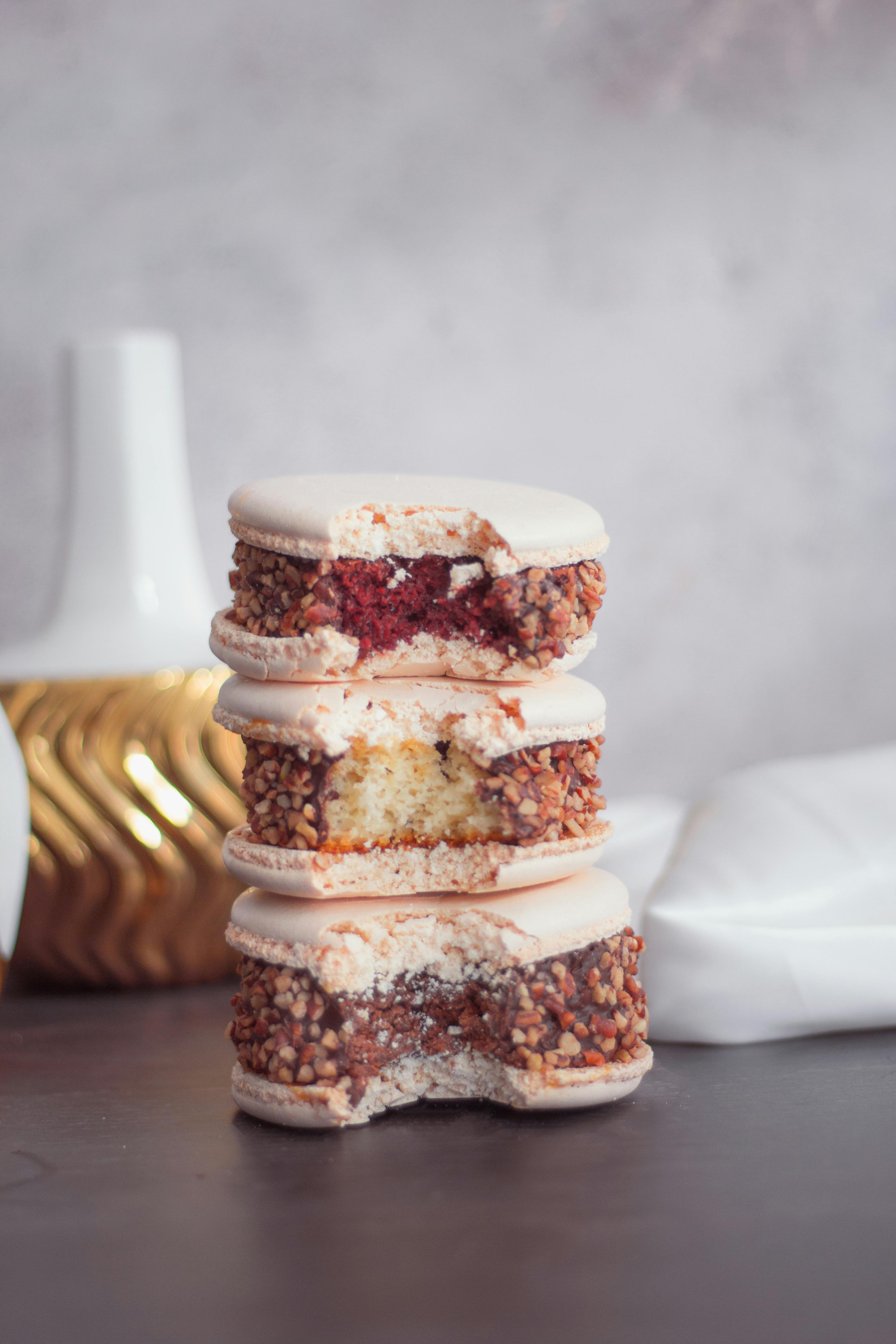 Stacked Gourmet Macarons with Nut Coating · Free Stock Photo