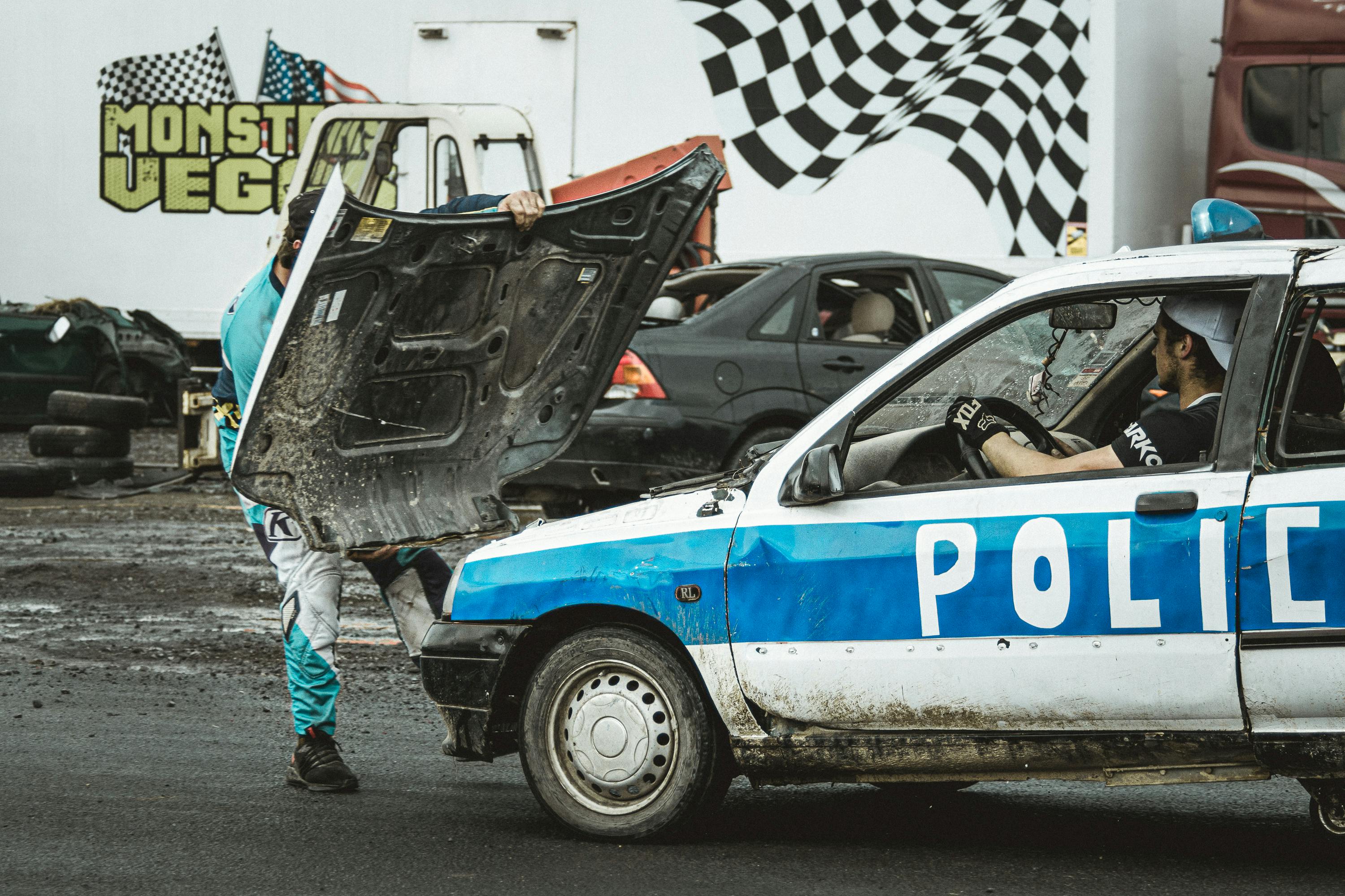 Police Car Stunt Scene at Monster Event · Free Stock Photo