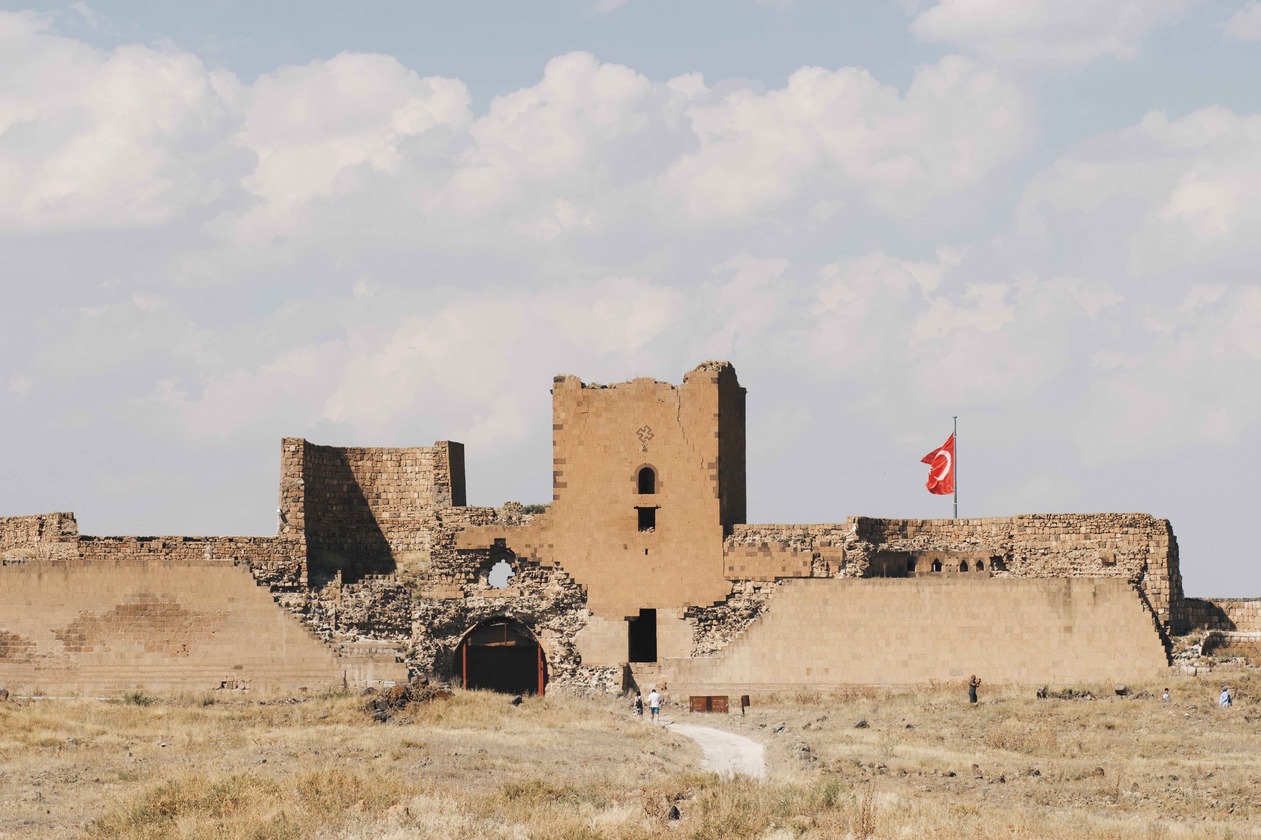 Ancient Castle Ruins with Turkish Flag · Free Stock Photo