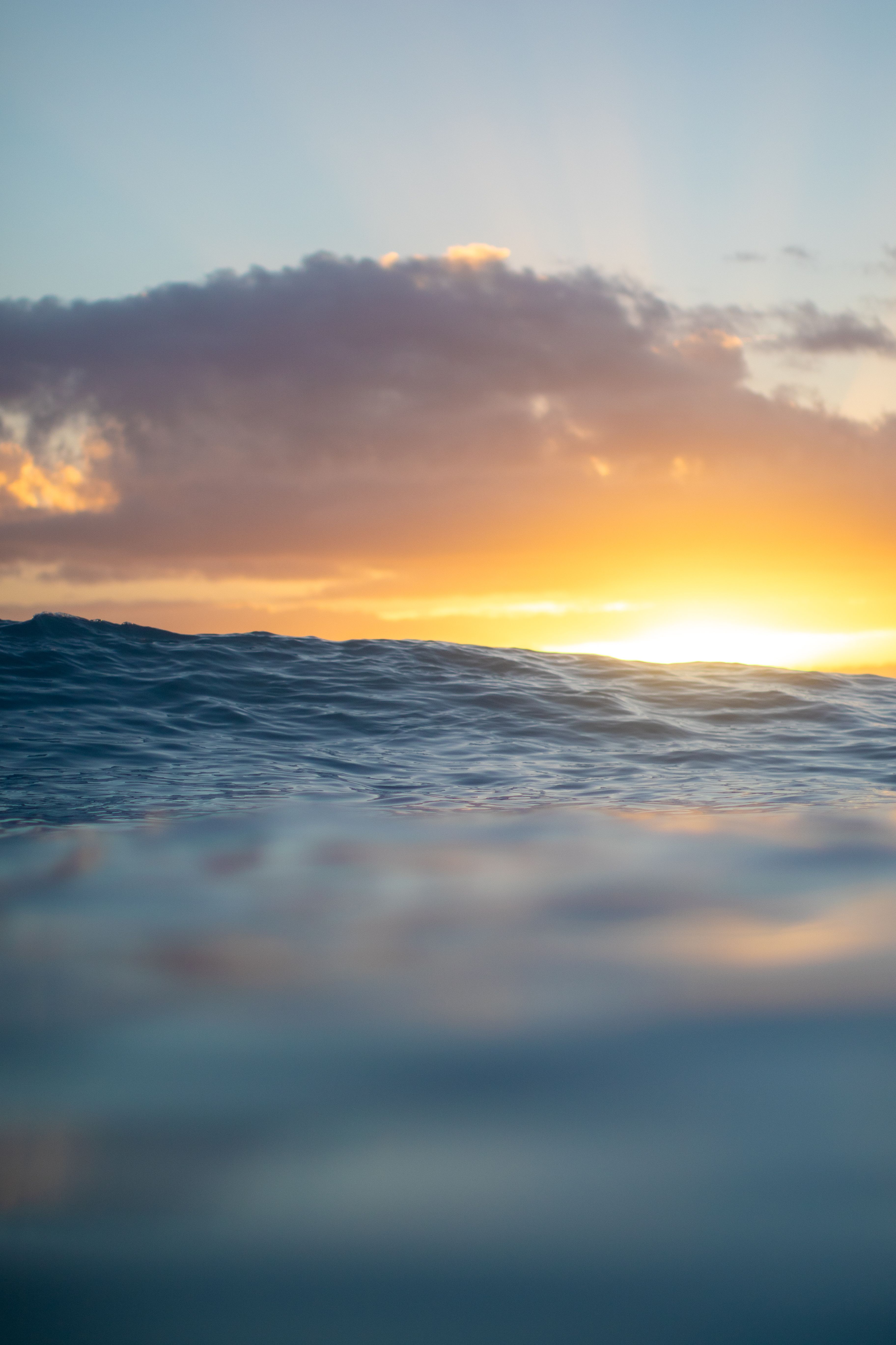Stunning Hawaiian Sunset Over Ocean Waves · Free Stock Photo
