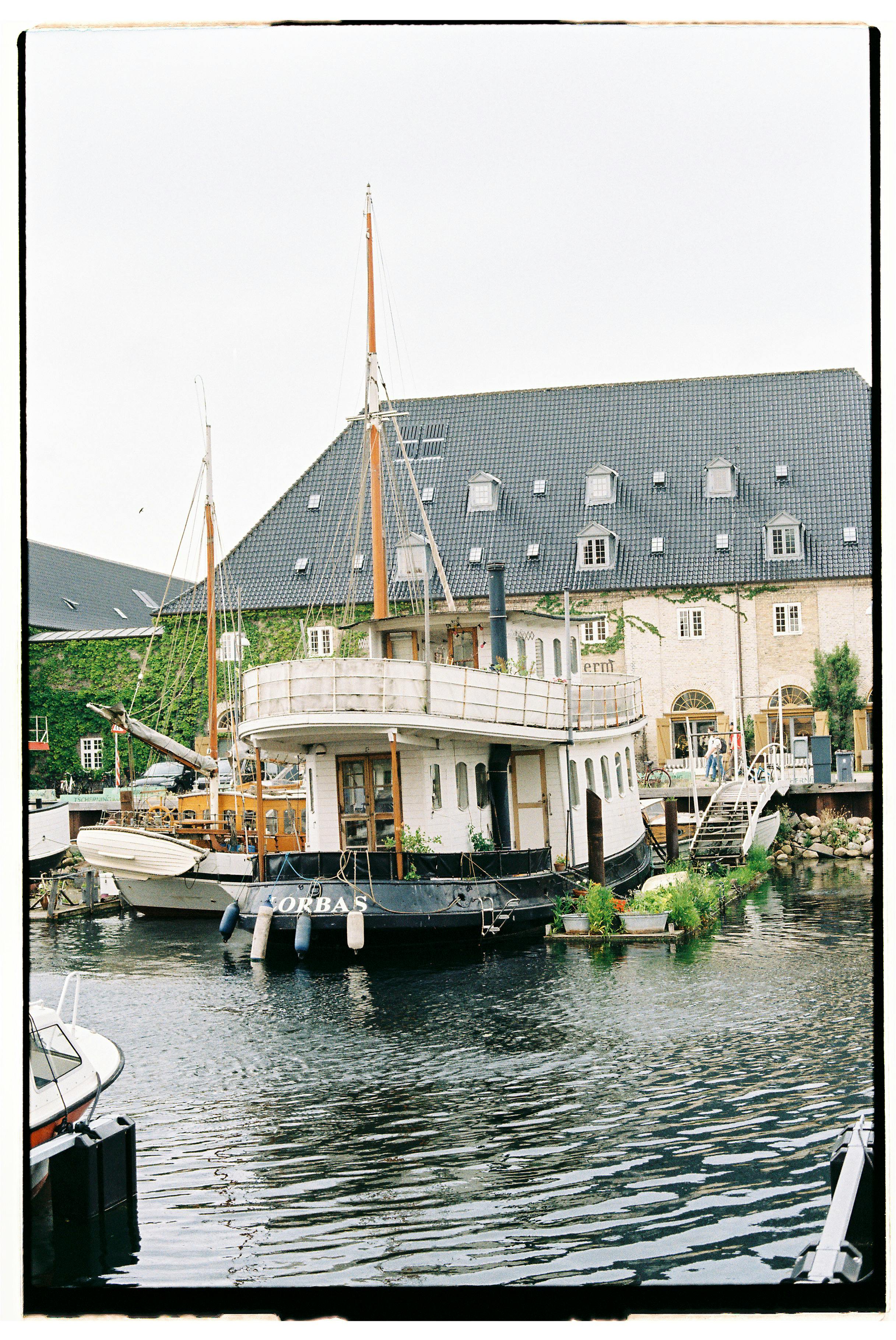 Scenic Harbor Scene with Historic Ship · Free Stock Photo