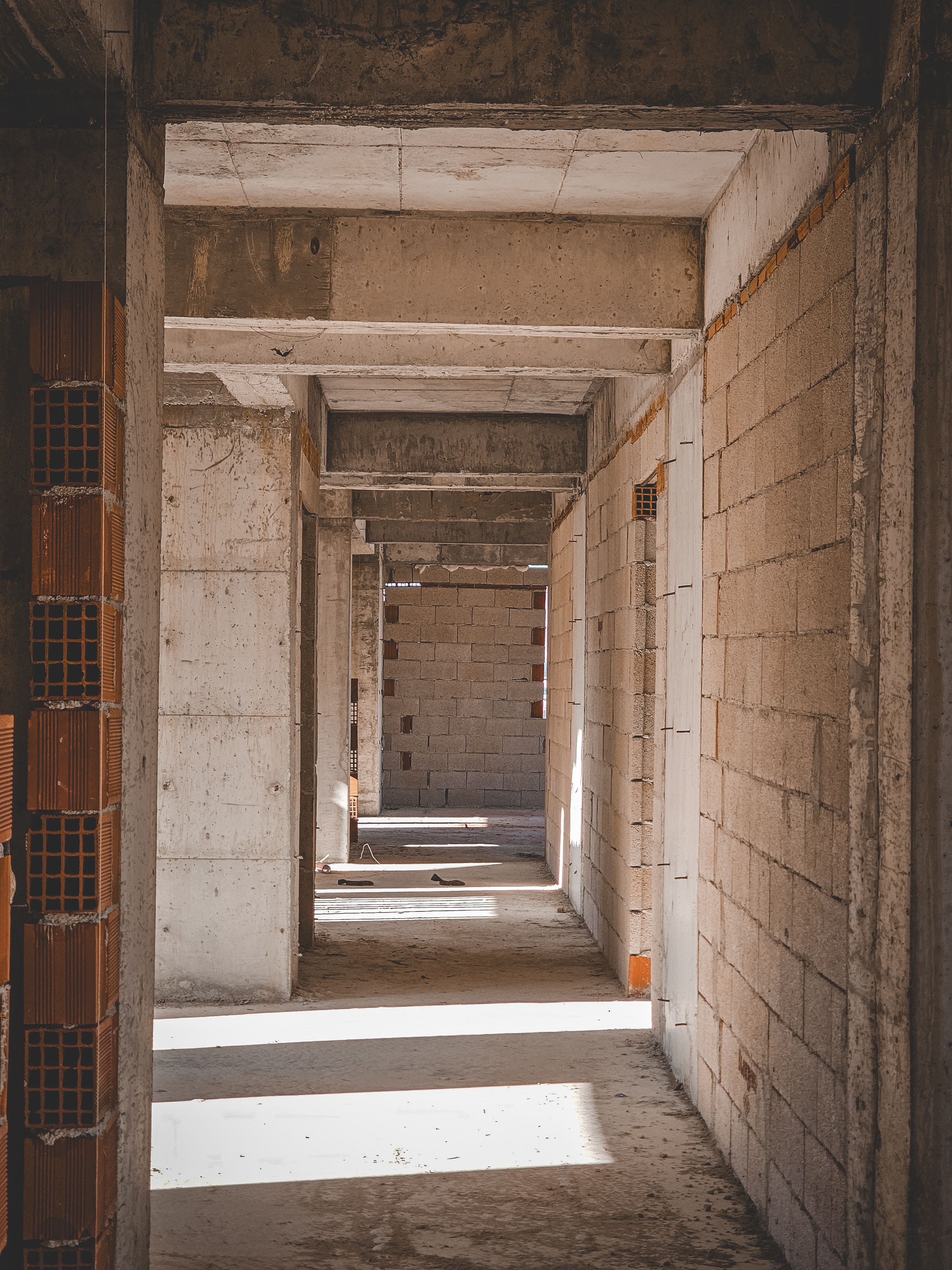 Unfinished Concrete Building Corridor · Free Stock Photo
