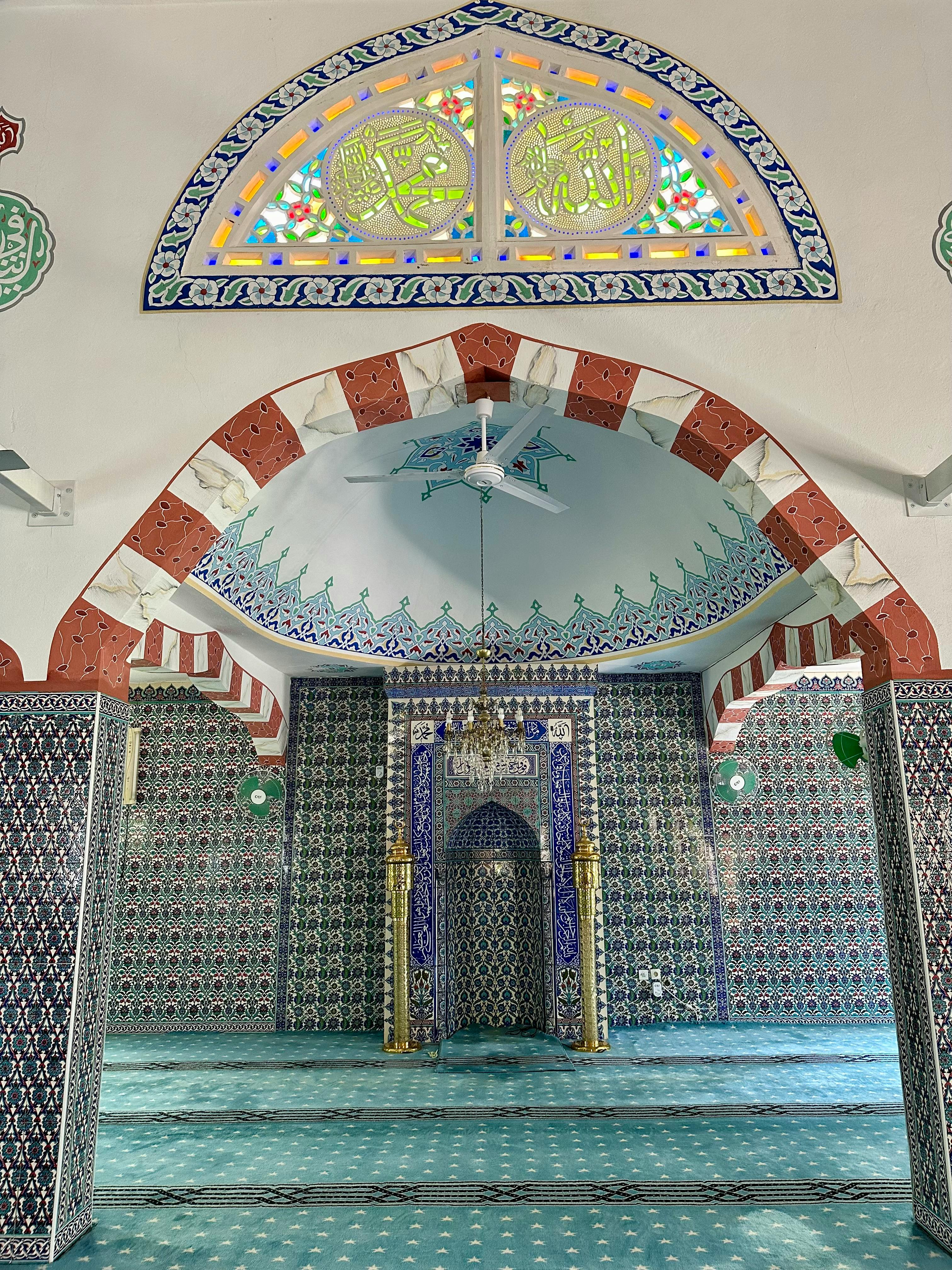 Intricate Mosque Interior with Islamic Patterns · Free Stock Photo