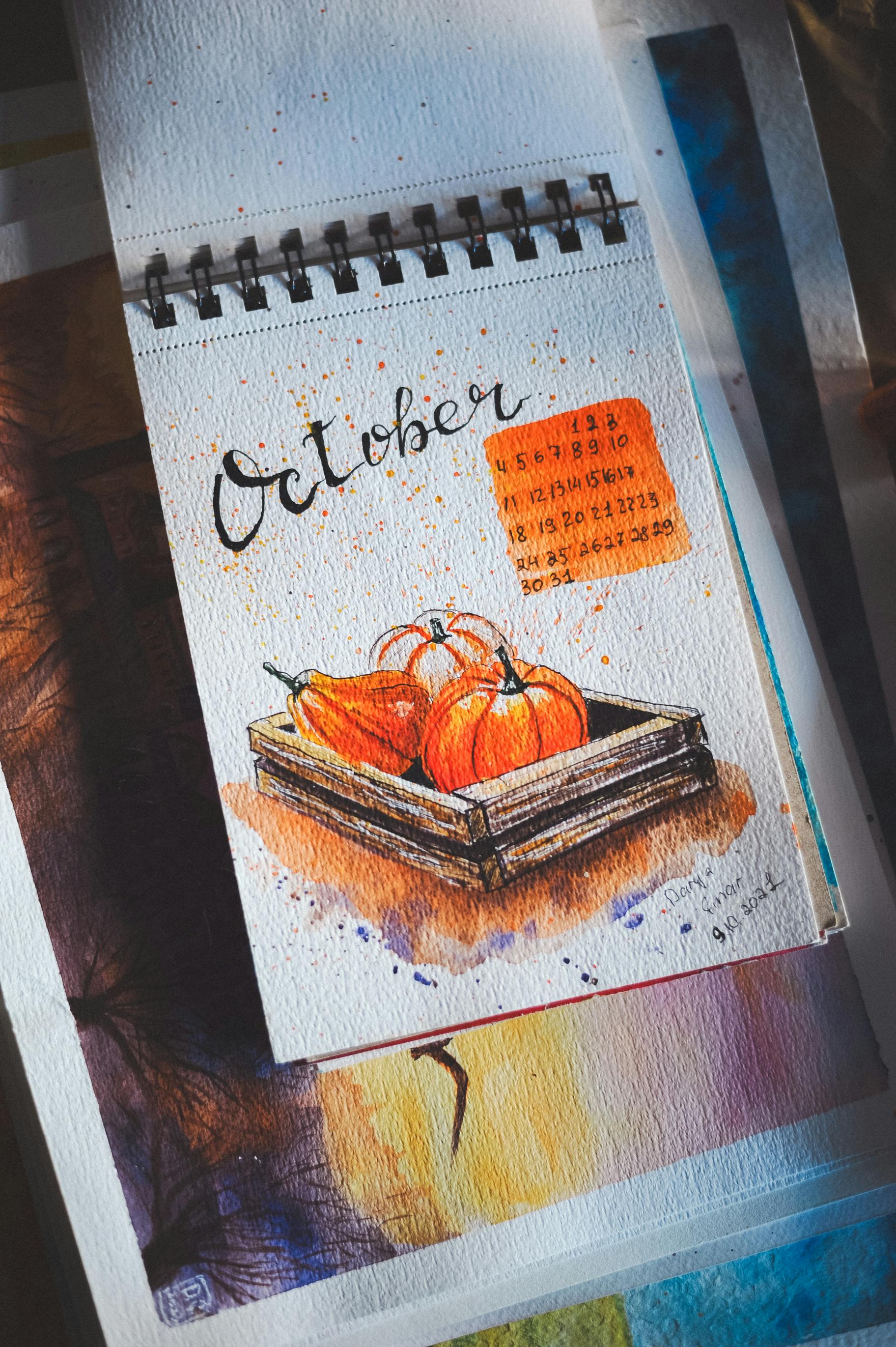 Artistic October Calendar Page with Pumpkins · Free Stock Photo