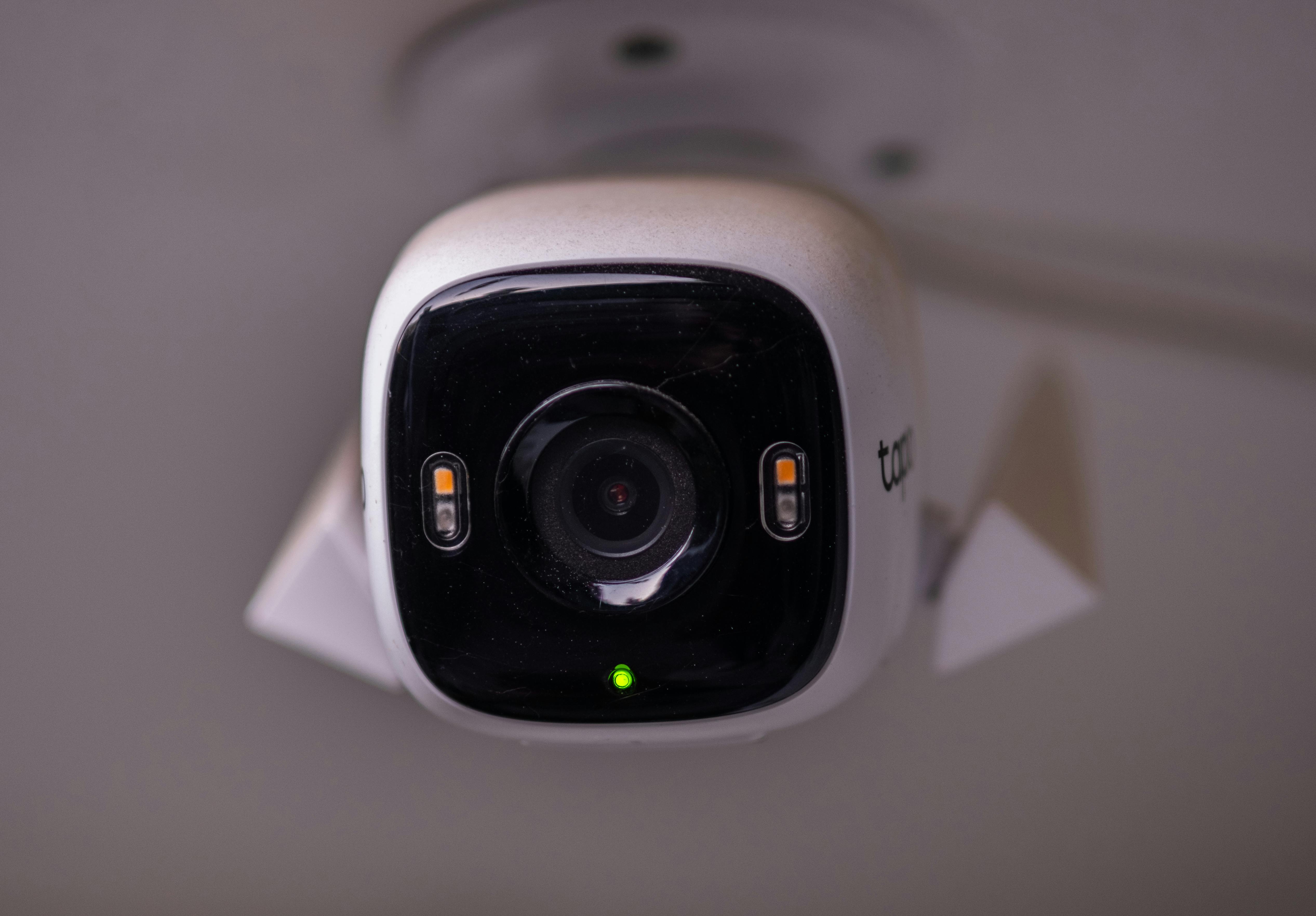 Close-up of a modern security camera in action · Free Stock Photo