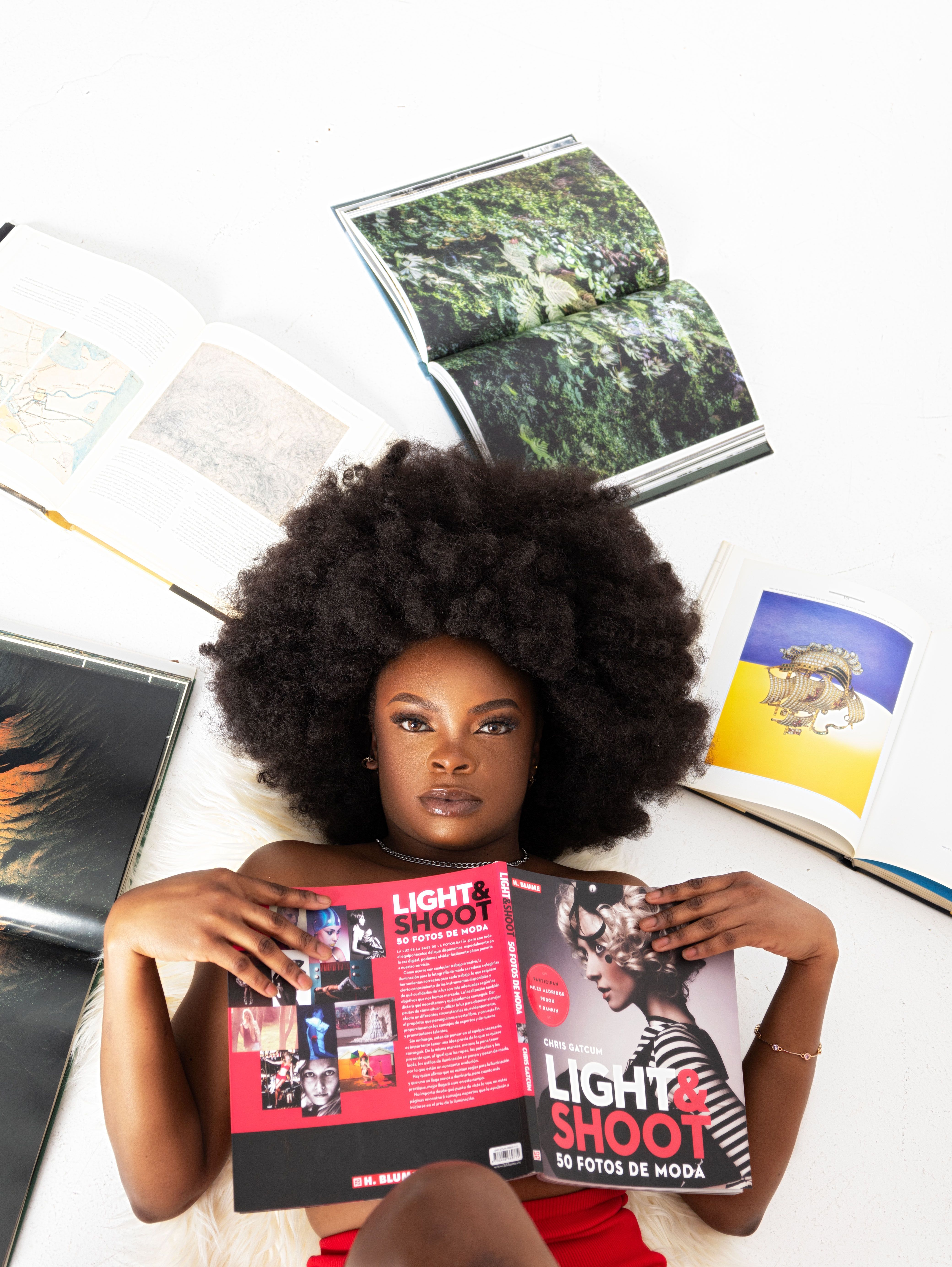 Stylish Portrait with Fashion Photography Book · Free Stock Photo
