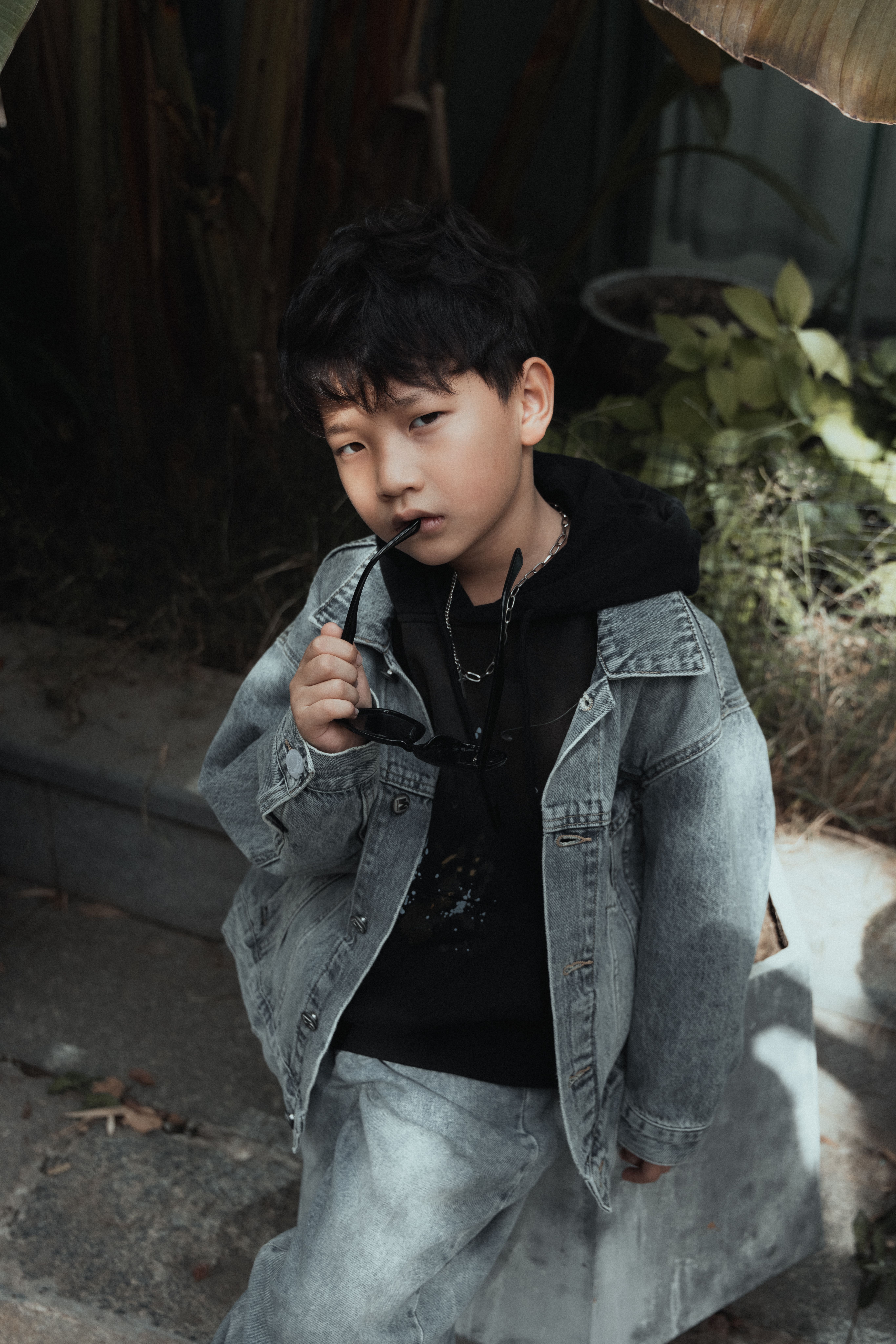 Cool Young Boy in Denim Jacket Outdoors · Free Stock Photo