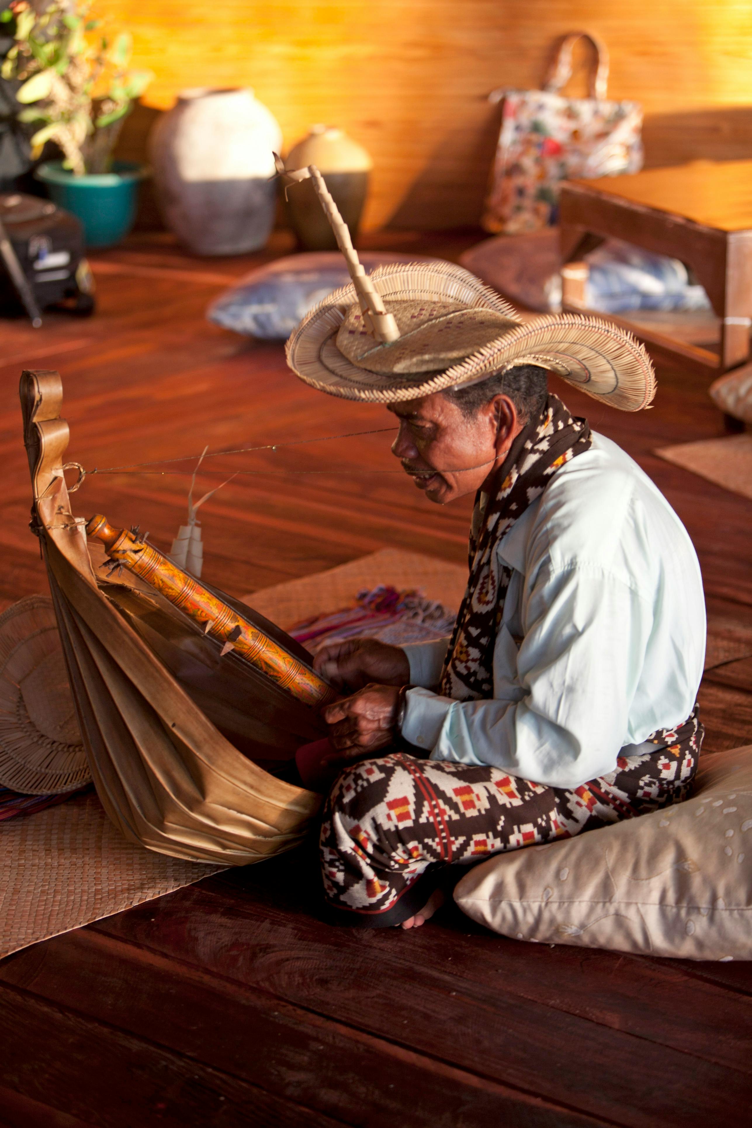 Traditional Musician Playing Indigenous Instrument · Free Stock Photo
