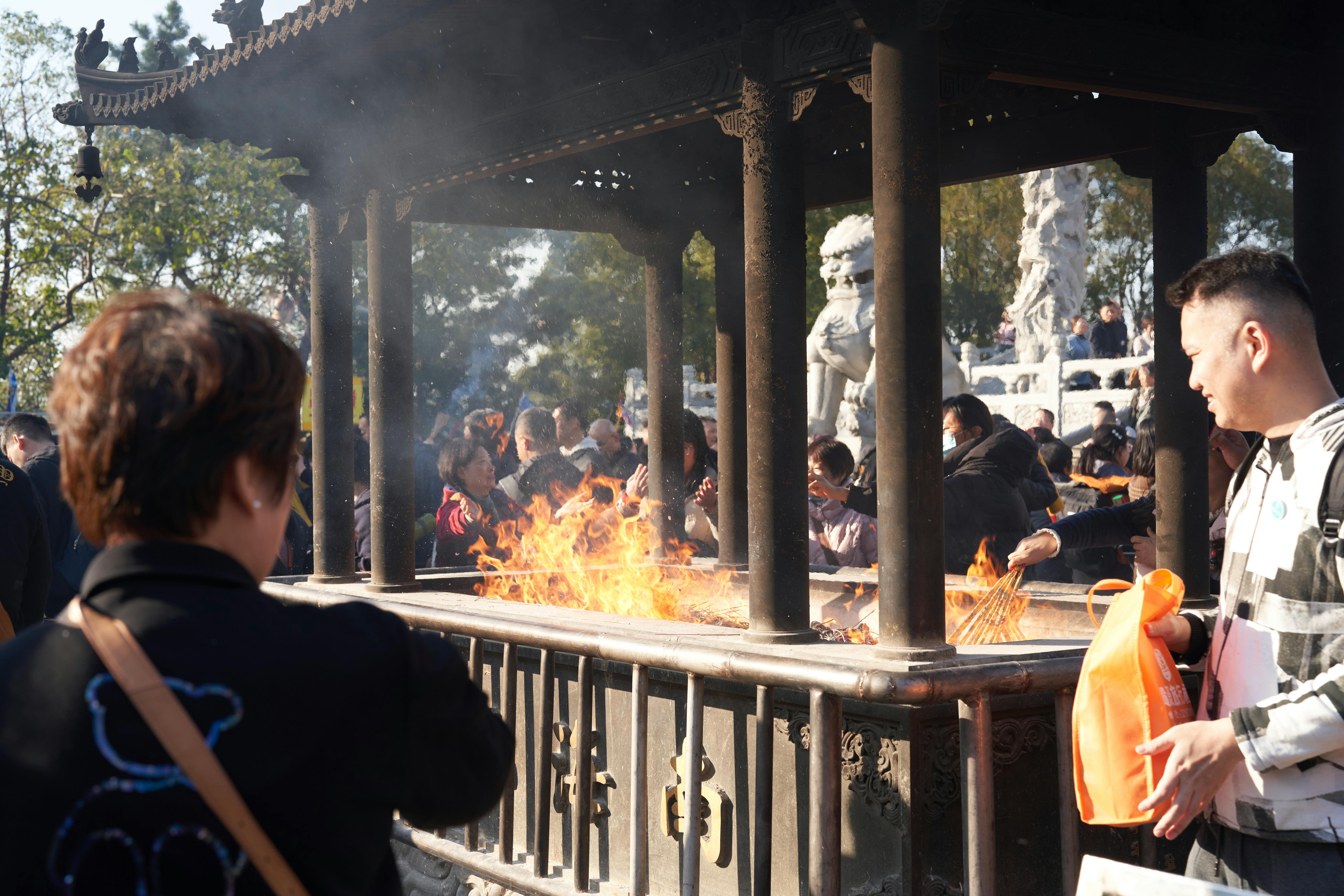 Outdoor Incense Burning Ritual at Temple · Free Stock Photo