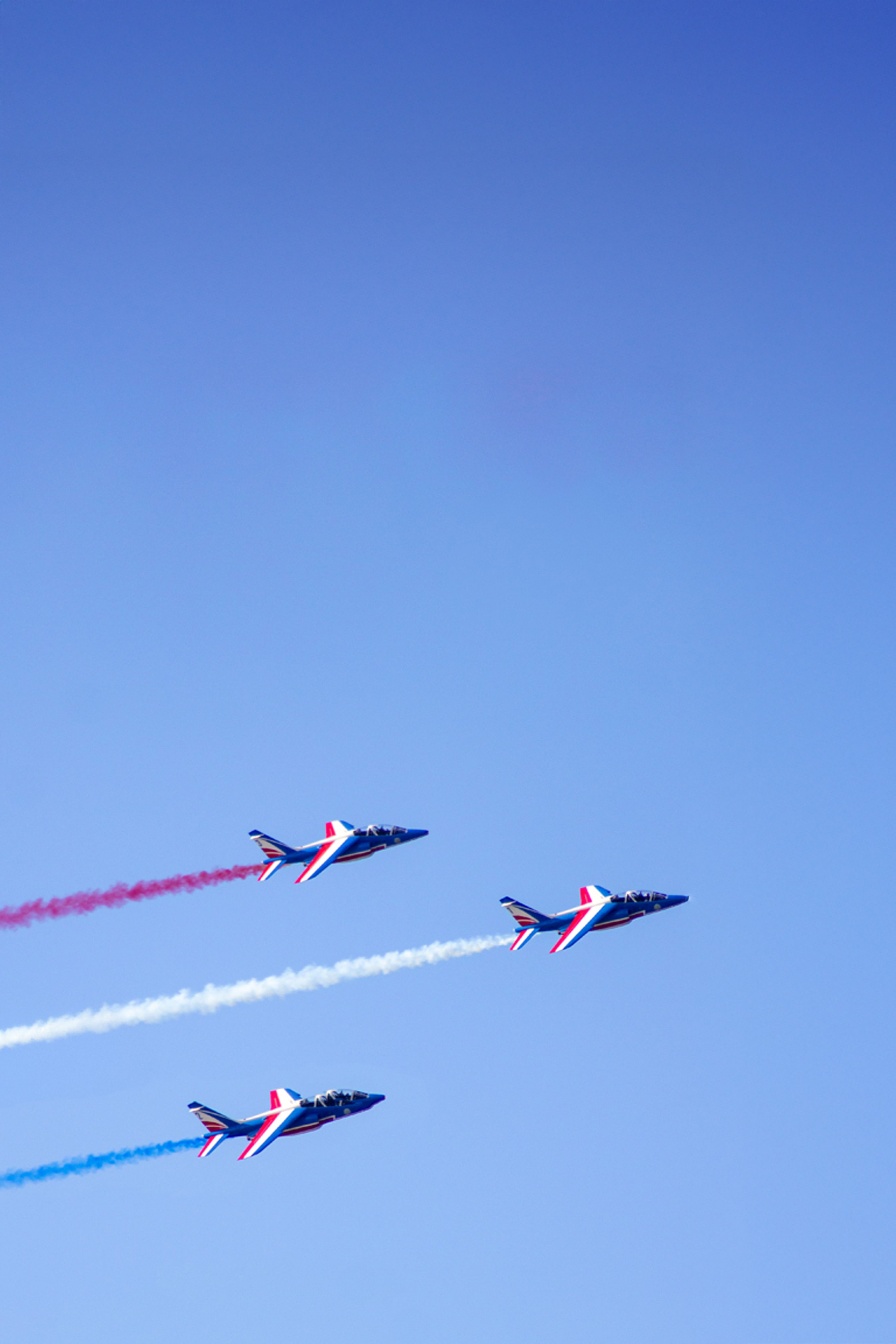French Air Patrol Jets Against Blue Sky · Free Stock Photo