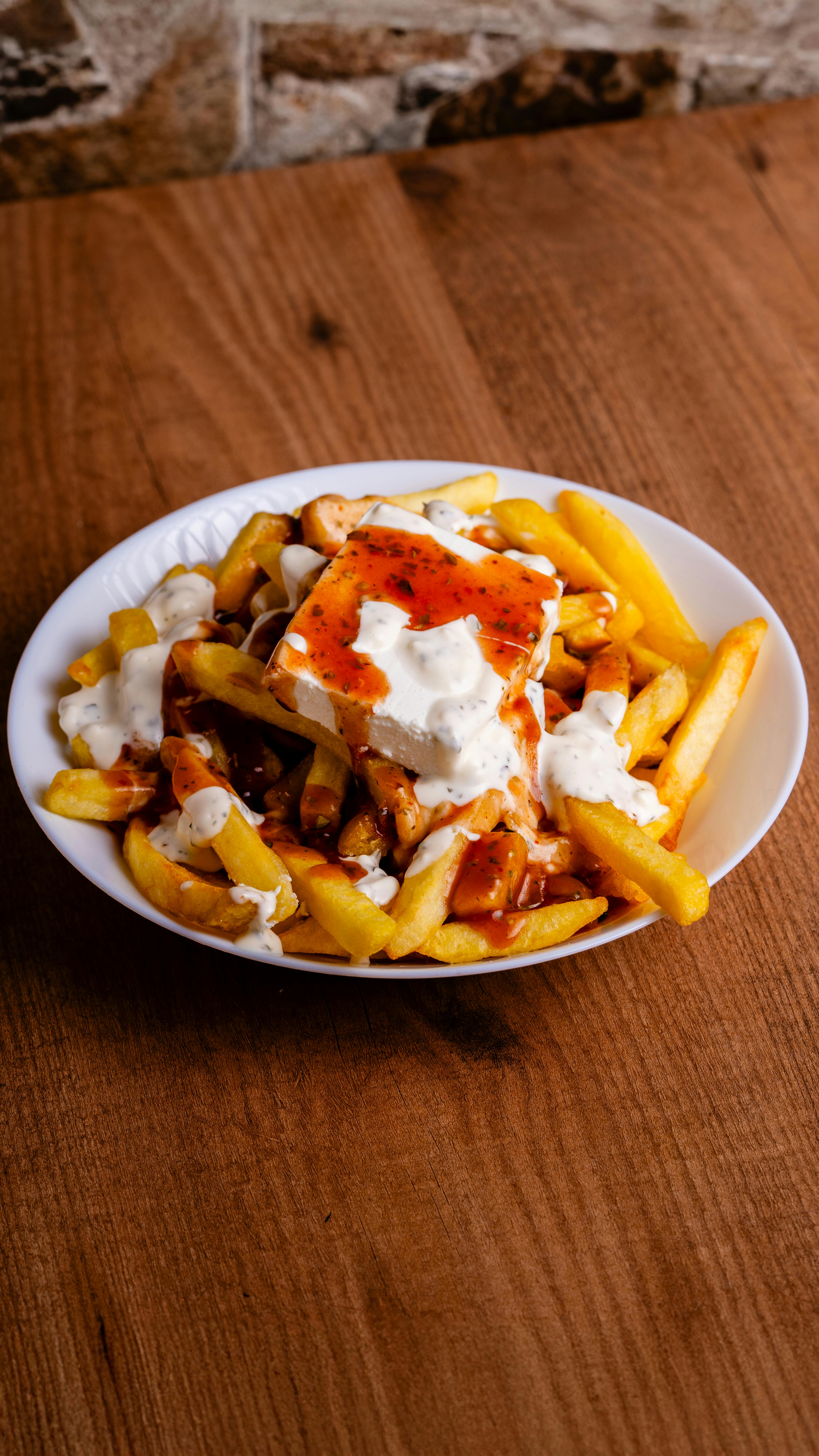 Delicious Greek Gyro Fries with Tzatziki Sauce · Free Stock Photo