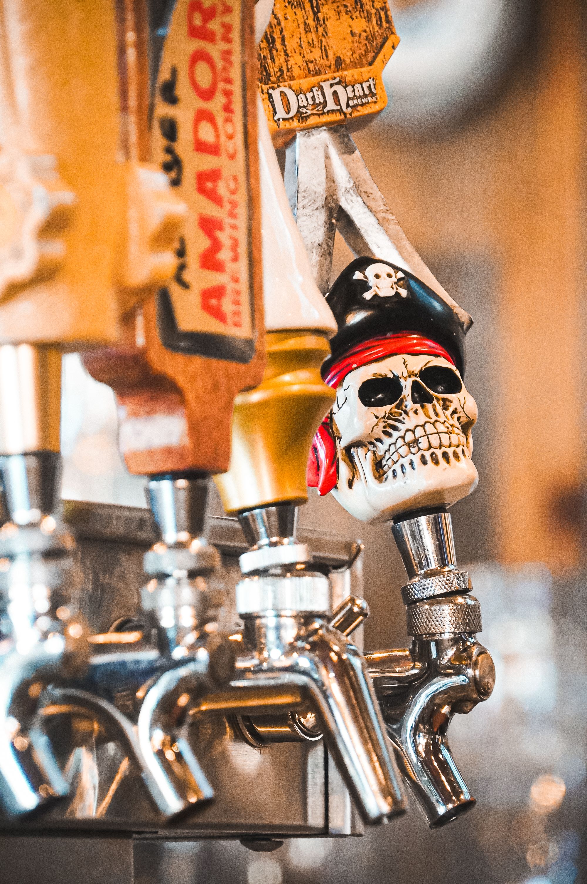 Close-Up of Beer Tap Handles in a Bar · Free Stock Photo