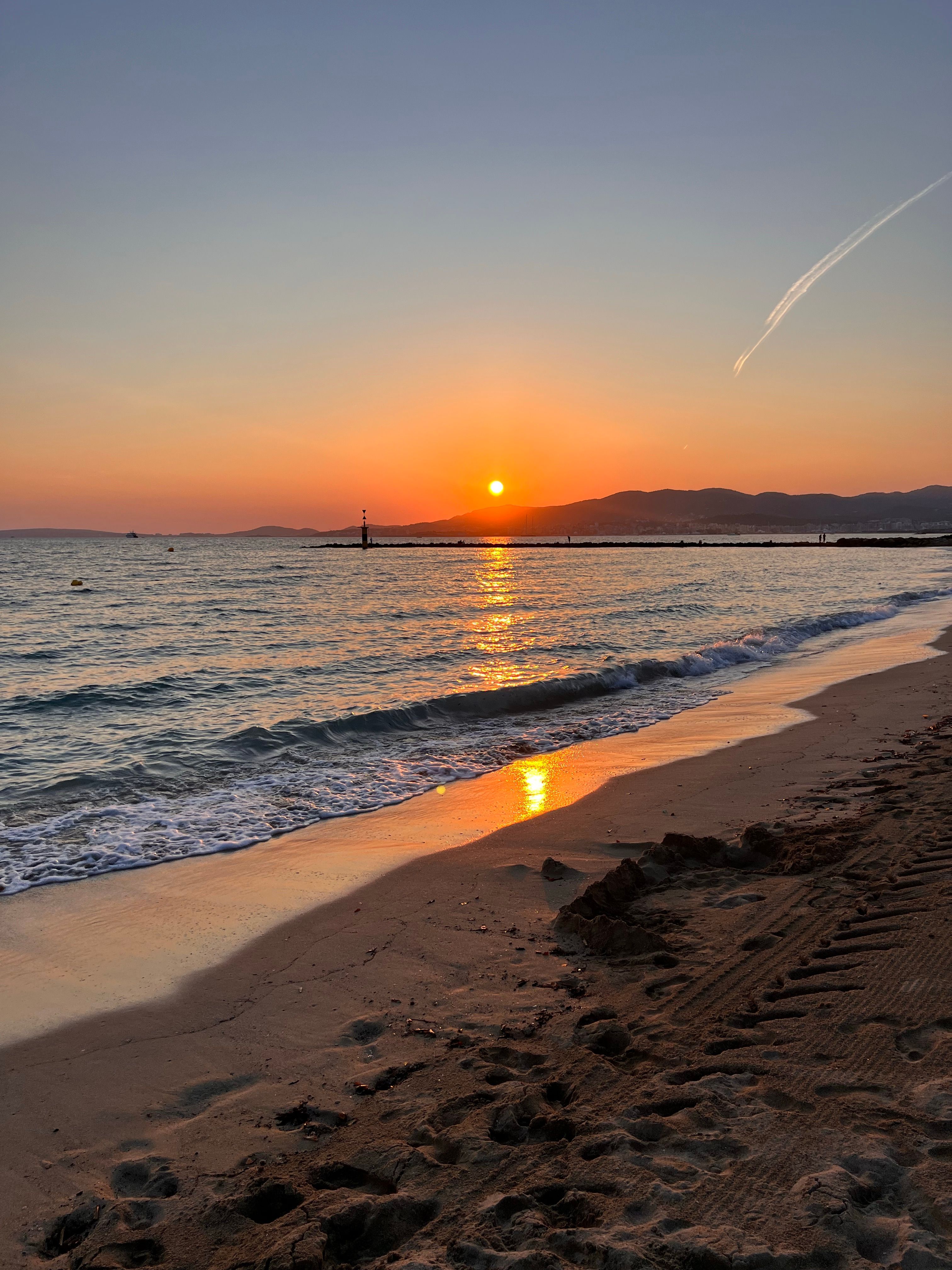 Stunning Sunset on a Sandy Beach · Free Stock Photo