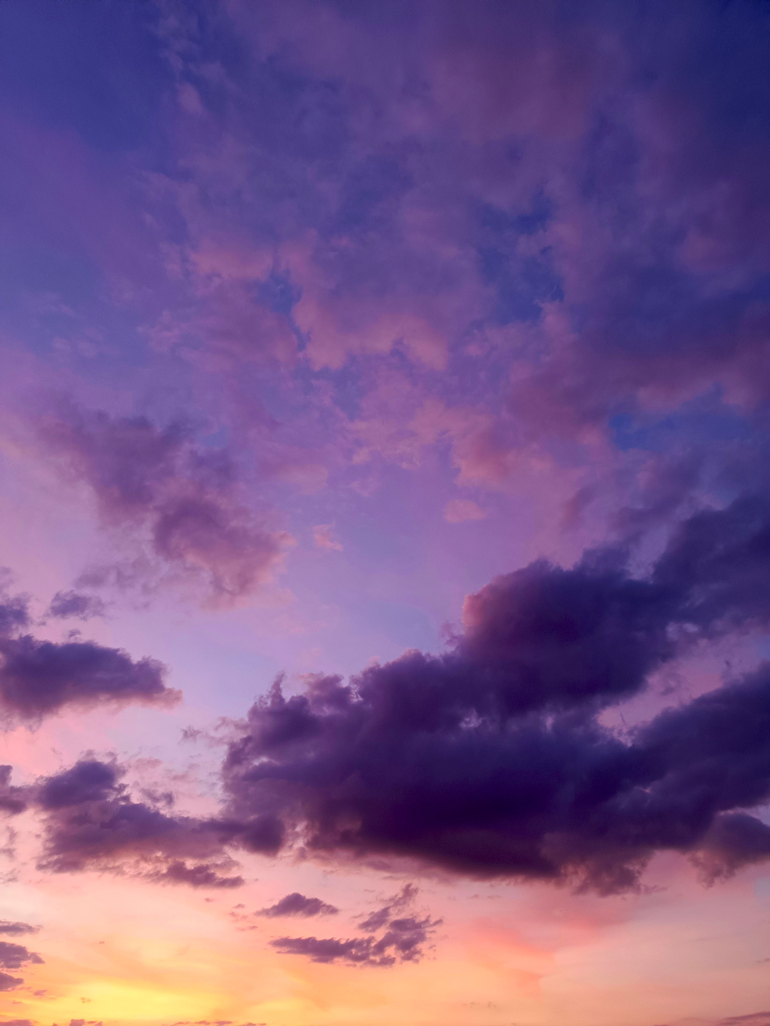 Dramatic Sunset with Purple Clouds · Free Stock Photo