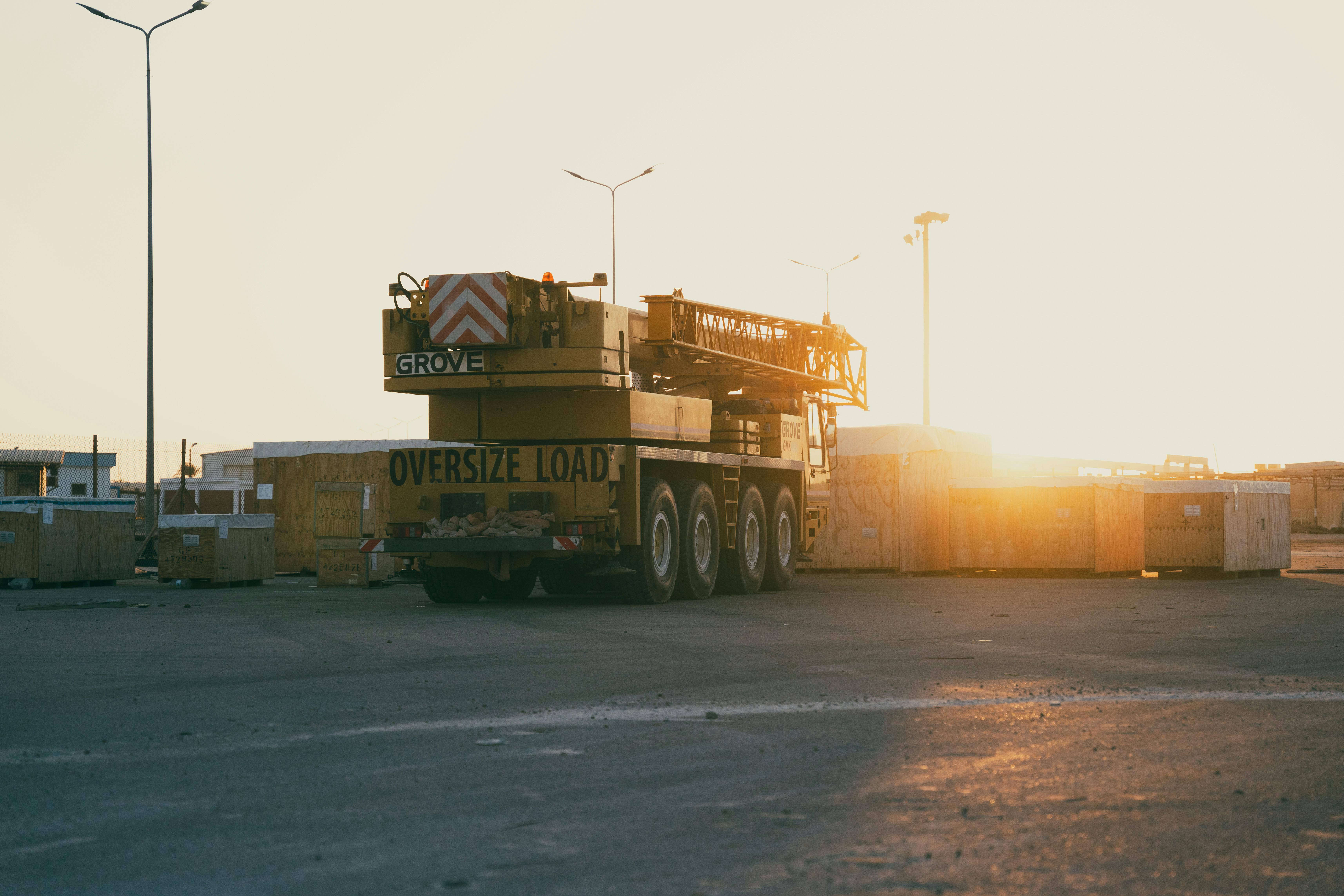 Industrial Crane at Sunset in Libya Construction Site · Free Stock Photo