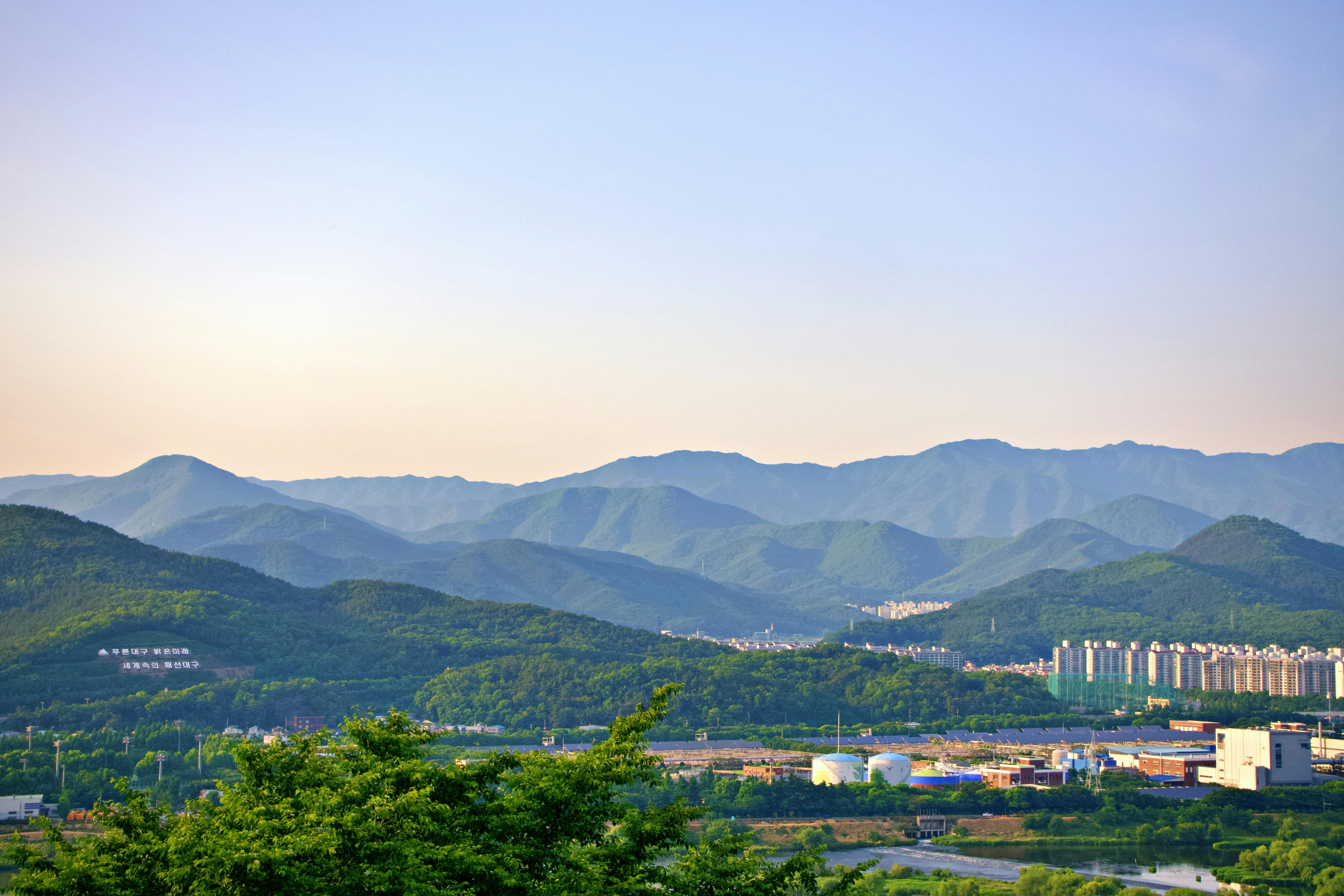 Scenic Daegu Cityscape with Mountains · Free Stock Photo