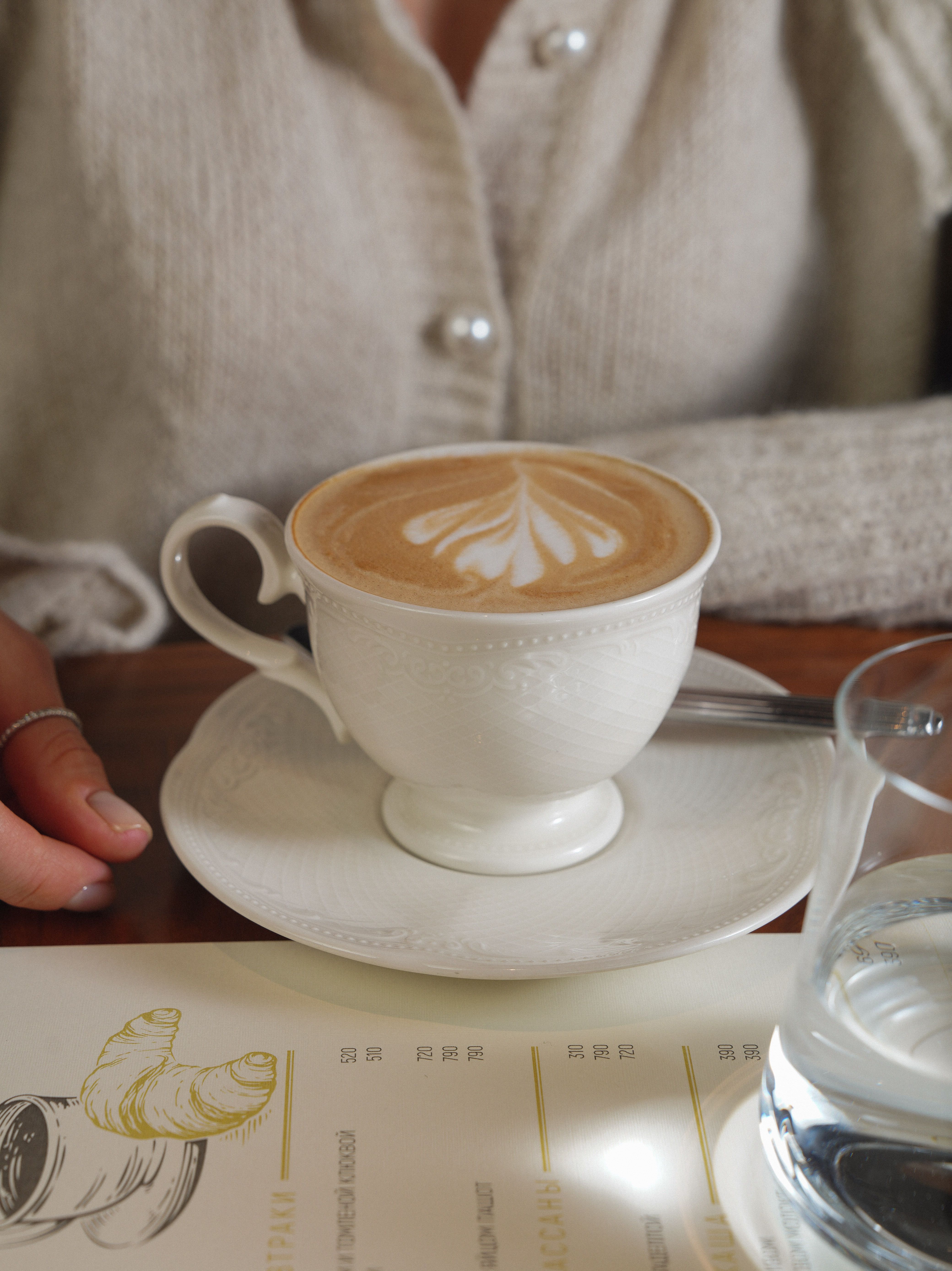 Elegant Coffee Cup on Cafe Table with Latte Art · Free Stock Photo