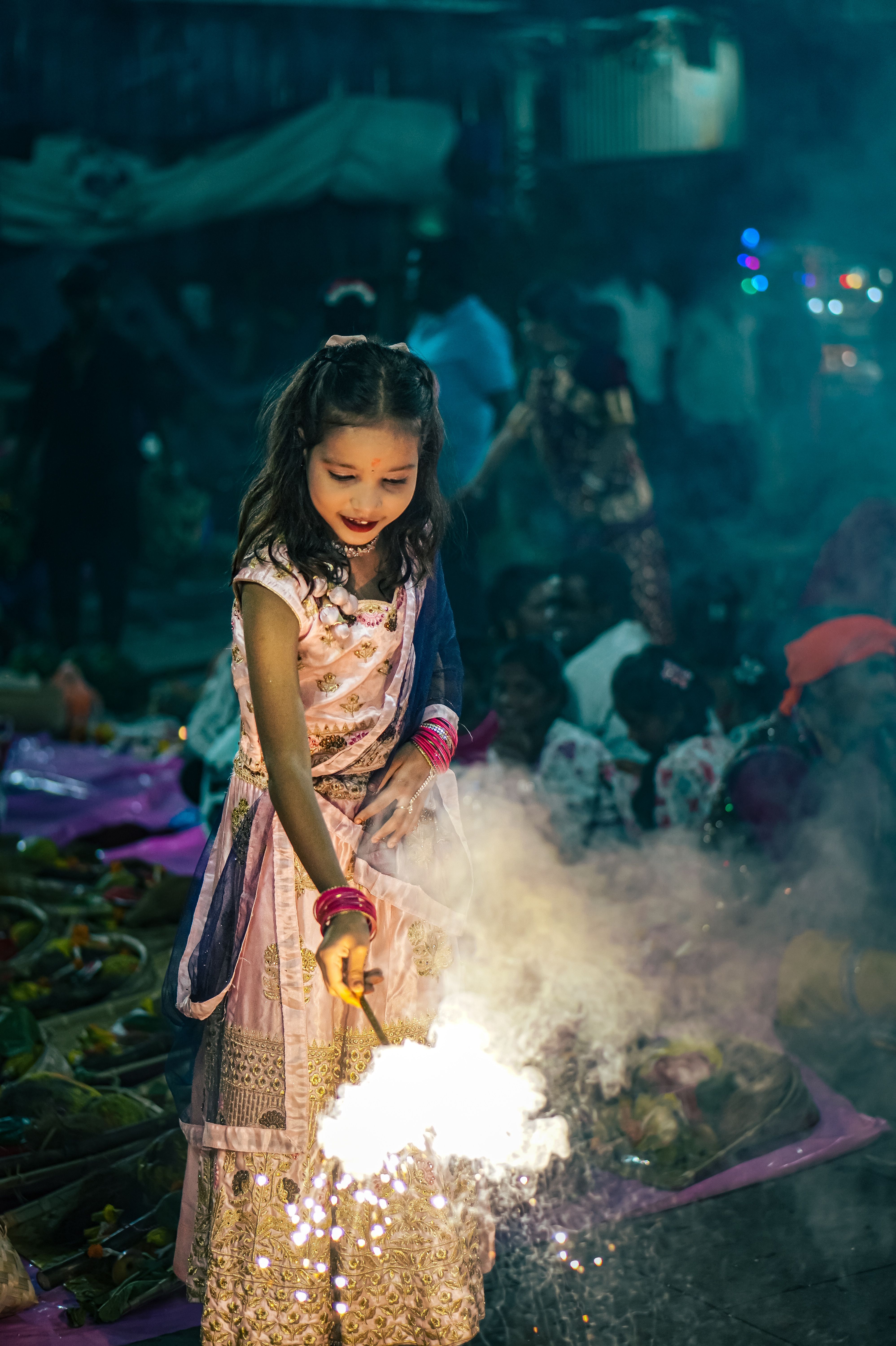 Young Girl Celebrating with Sparkler at Night Celebration · Free Stock ...