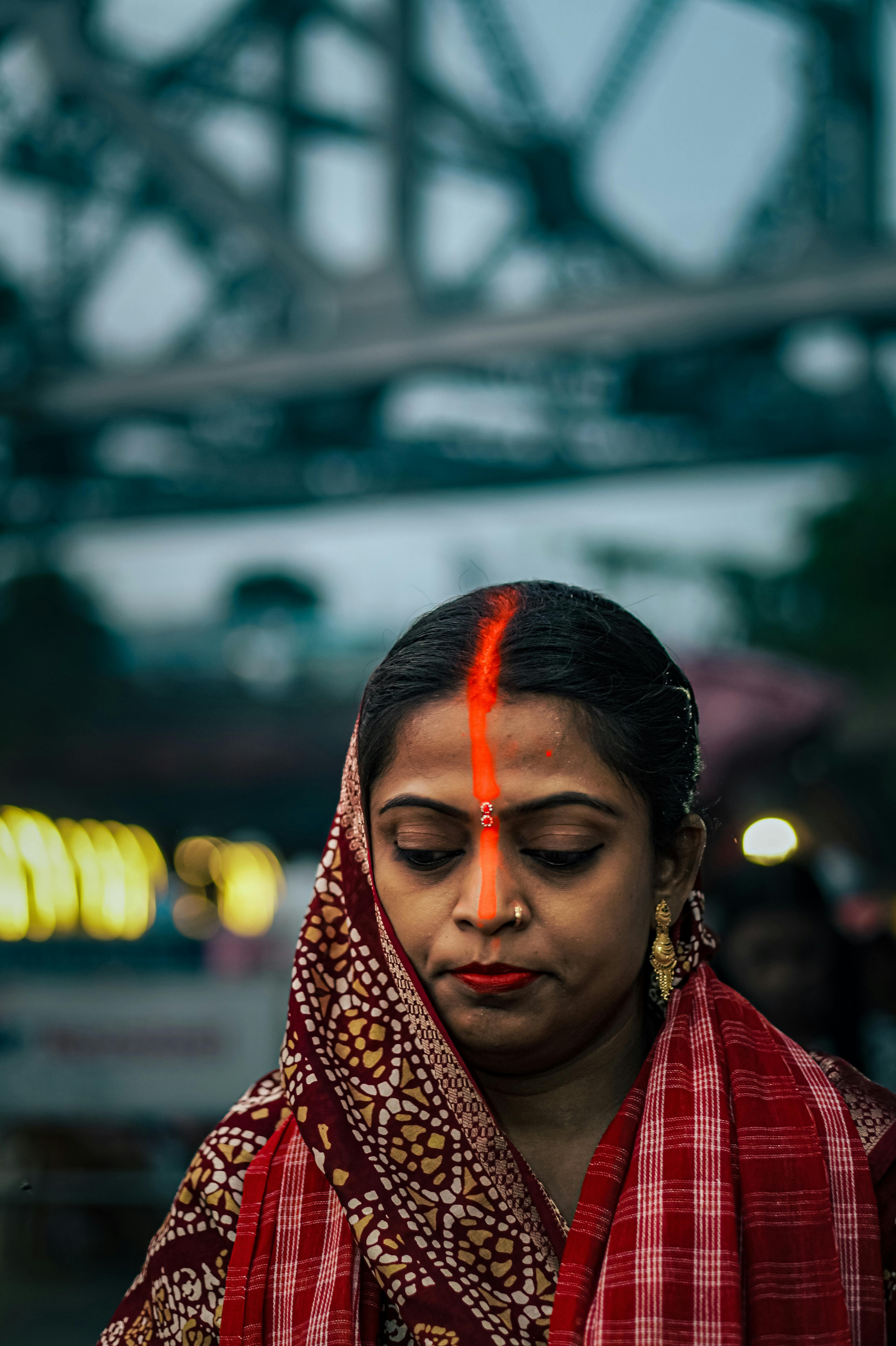 Traditional Indian Woman with Sindoor and Bridge · Free Stock Photo