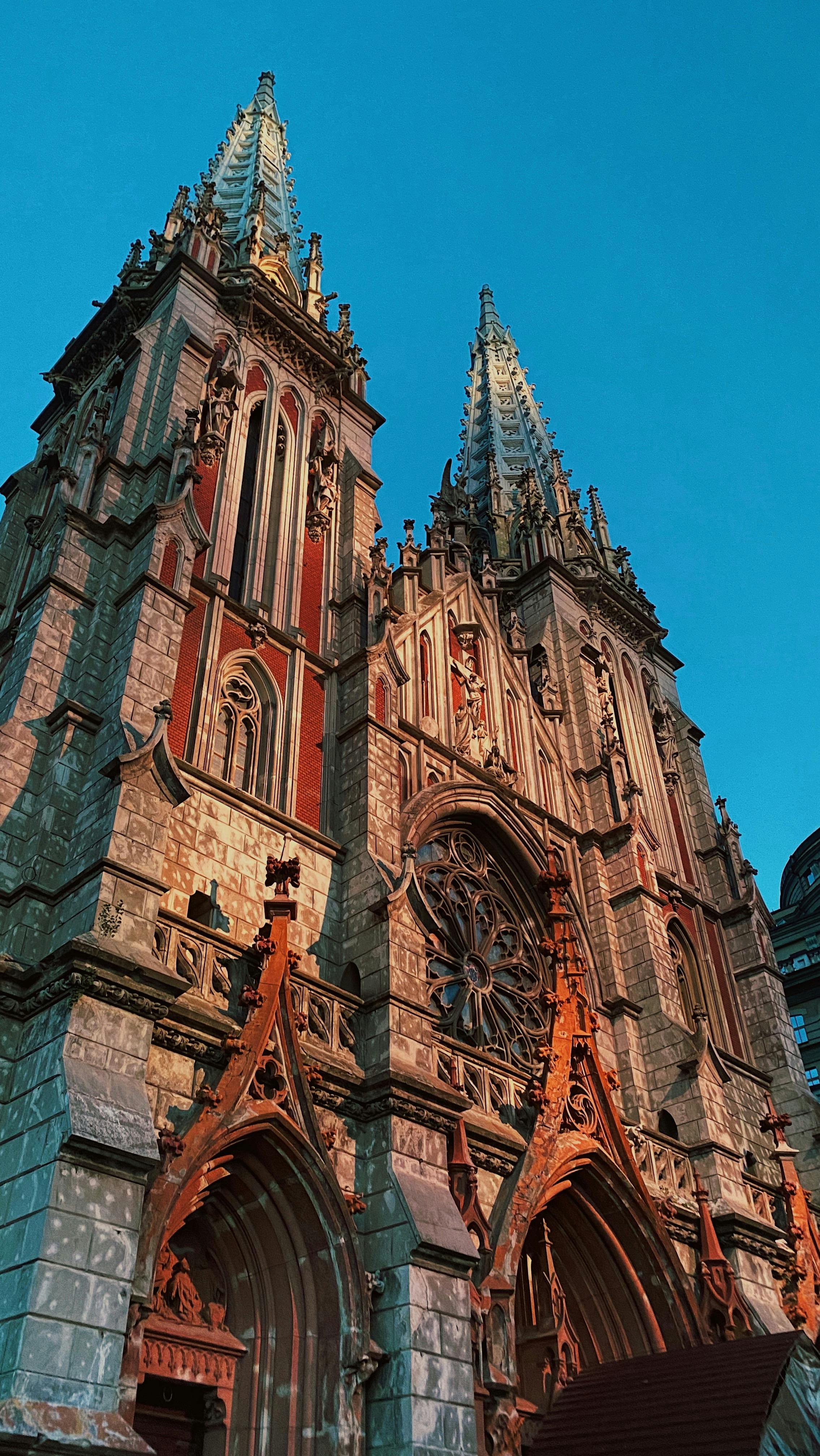 Stunning Neo-Gothic Church Architecture at Sunset · Free Stock Photo