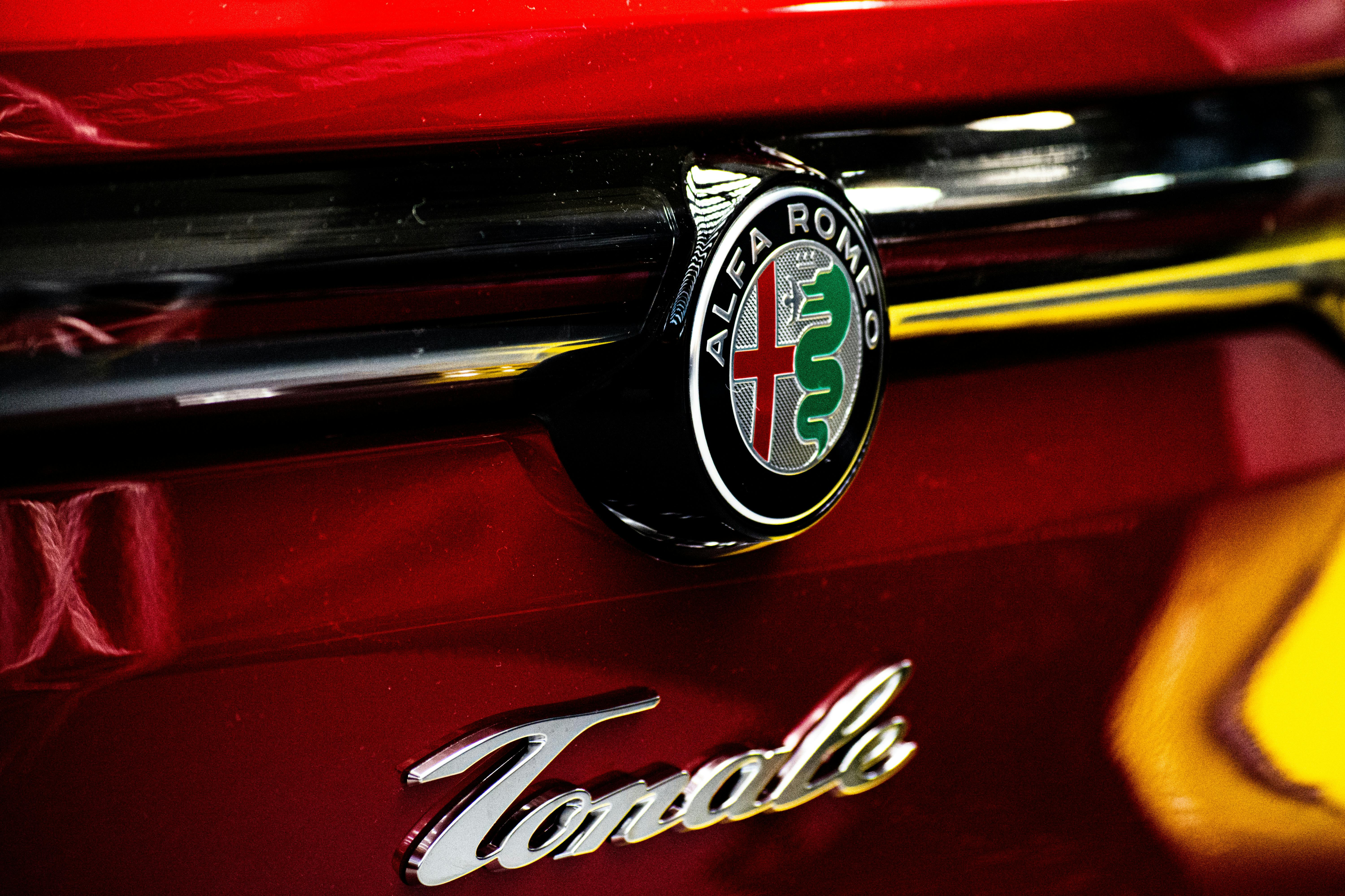 Close-up of Alfa Romeo Tonale Emblem · Free Stock Photo