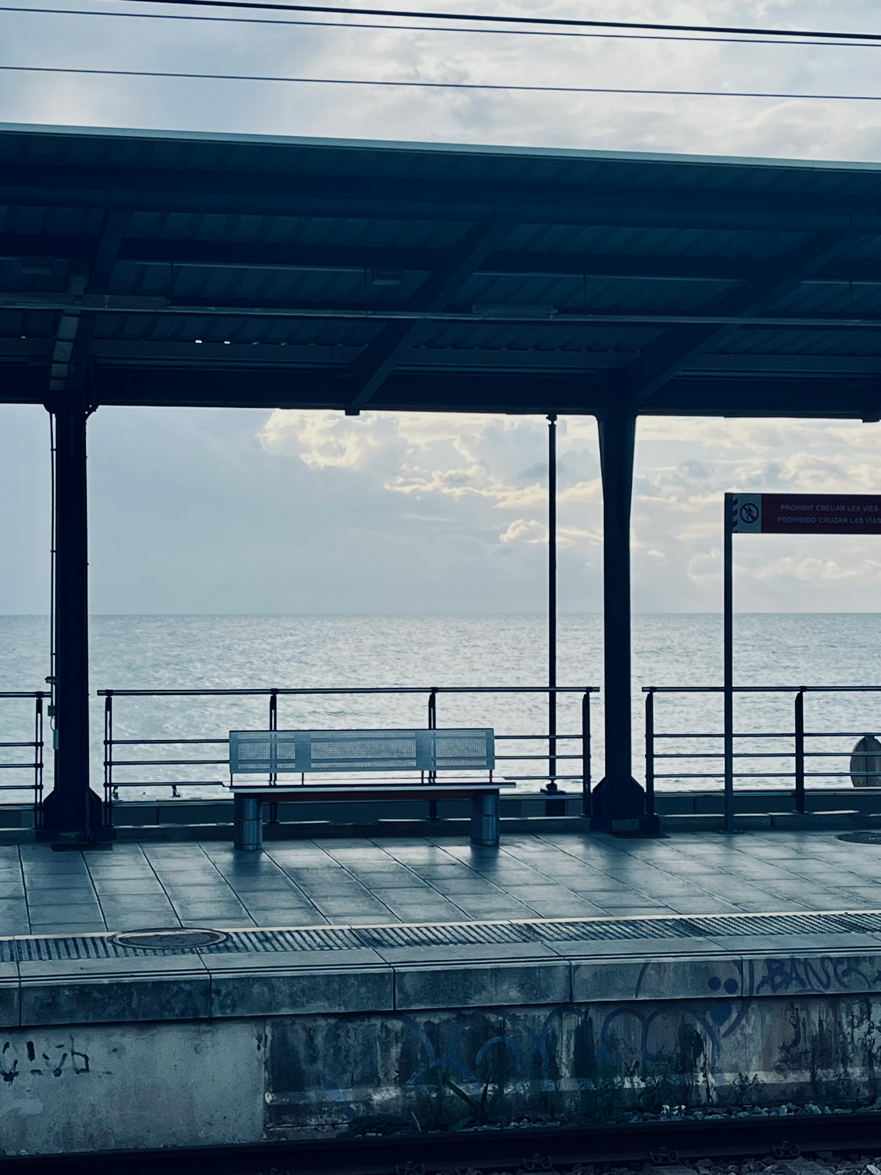 Peaceful Seaside Train Station Platform · Free Stock Photo