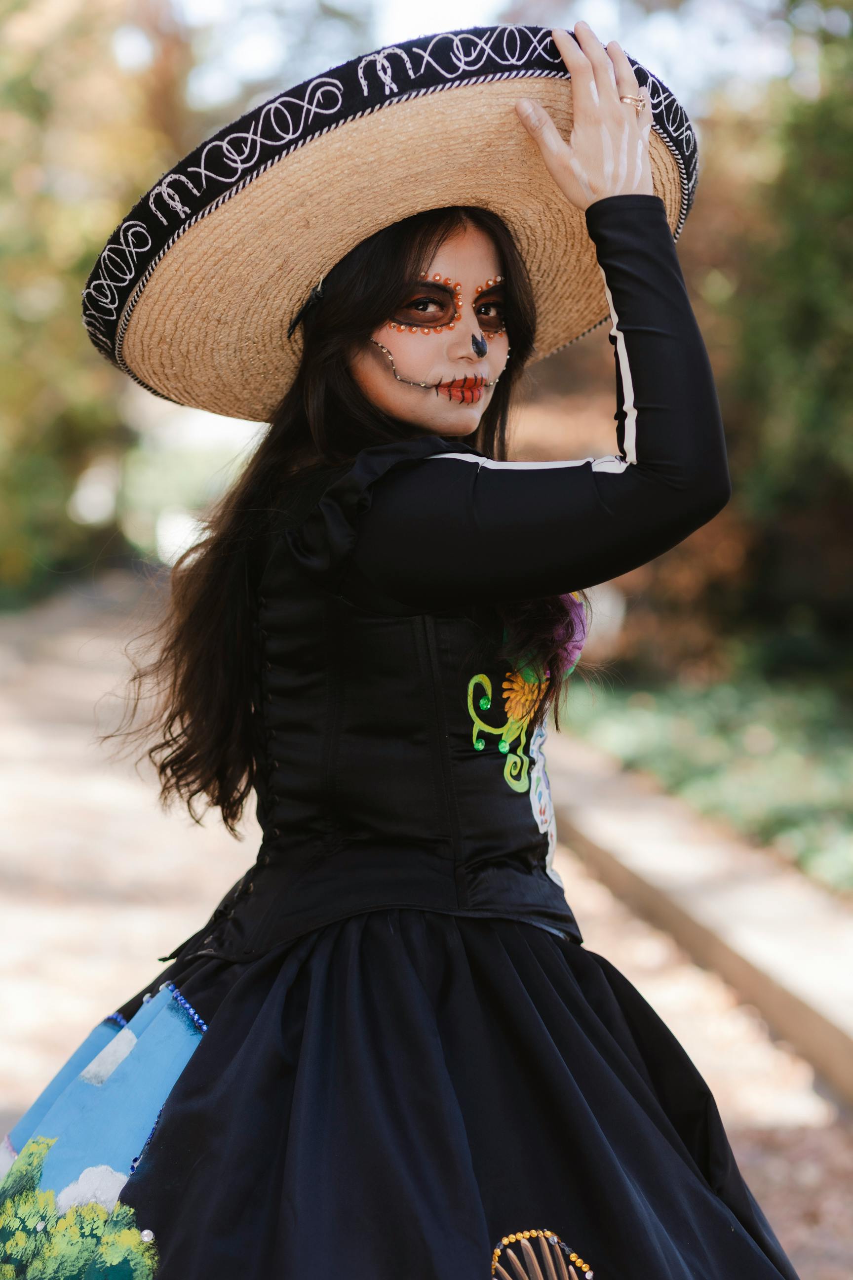 Beautiful Catrina in Traditional Dress with Sombrero · Free Stock Photo