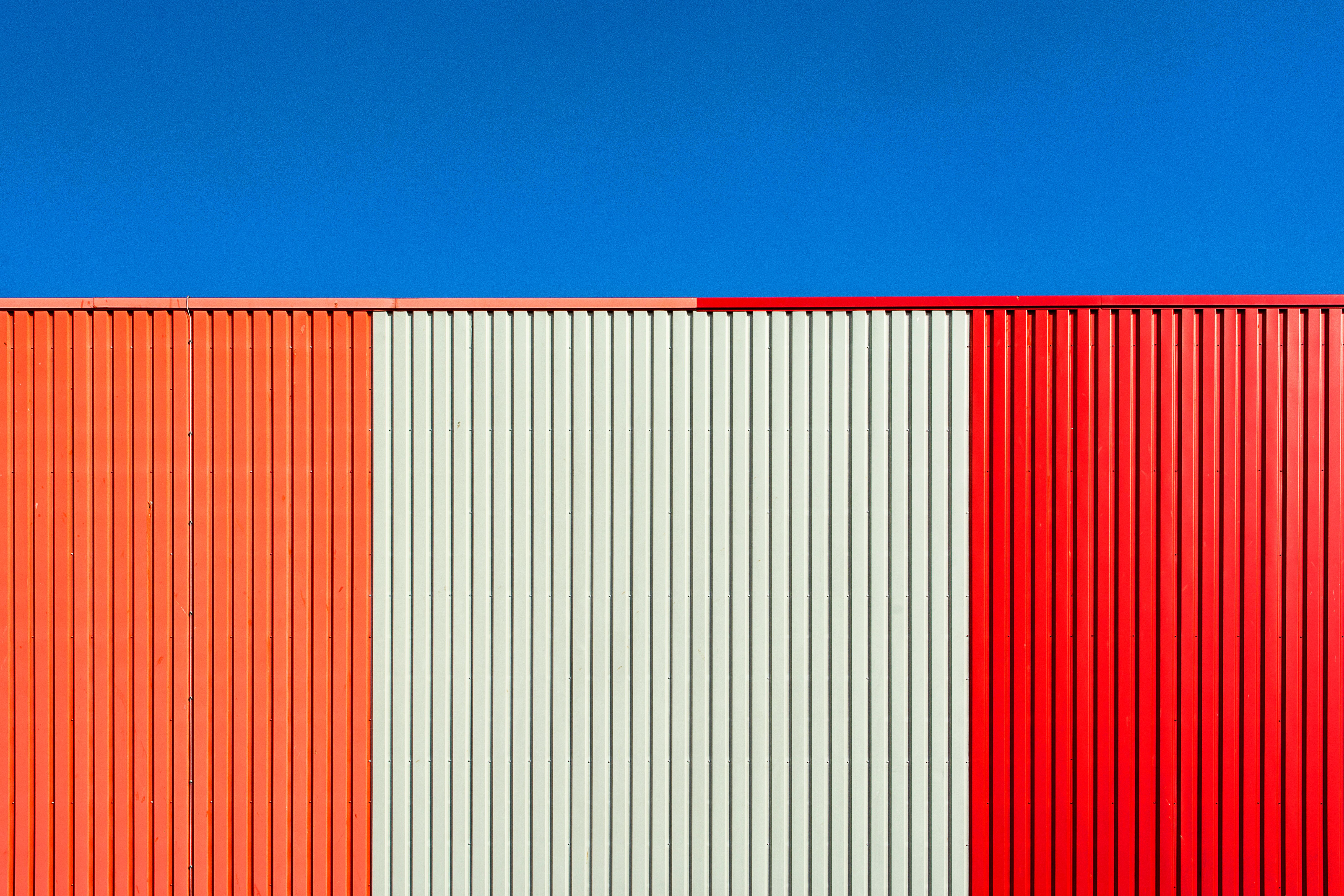 Colorful Abstract Architecture Against Blue Sky · Free Stock Photo