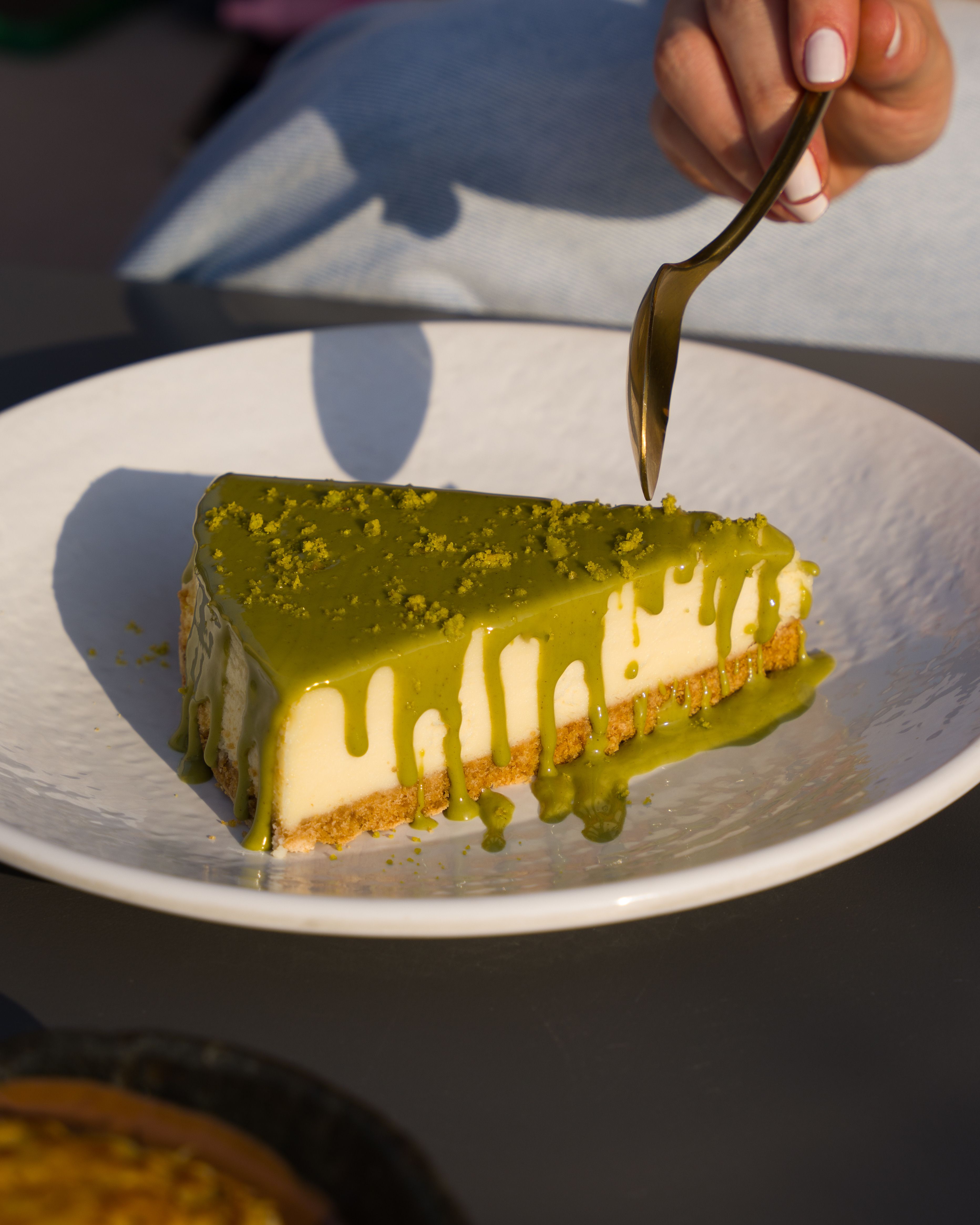 Delicious Matcha Cheesecake Slice with Fork · Free Stock Photo