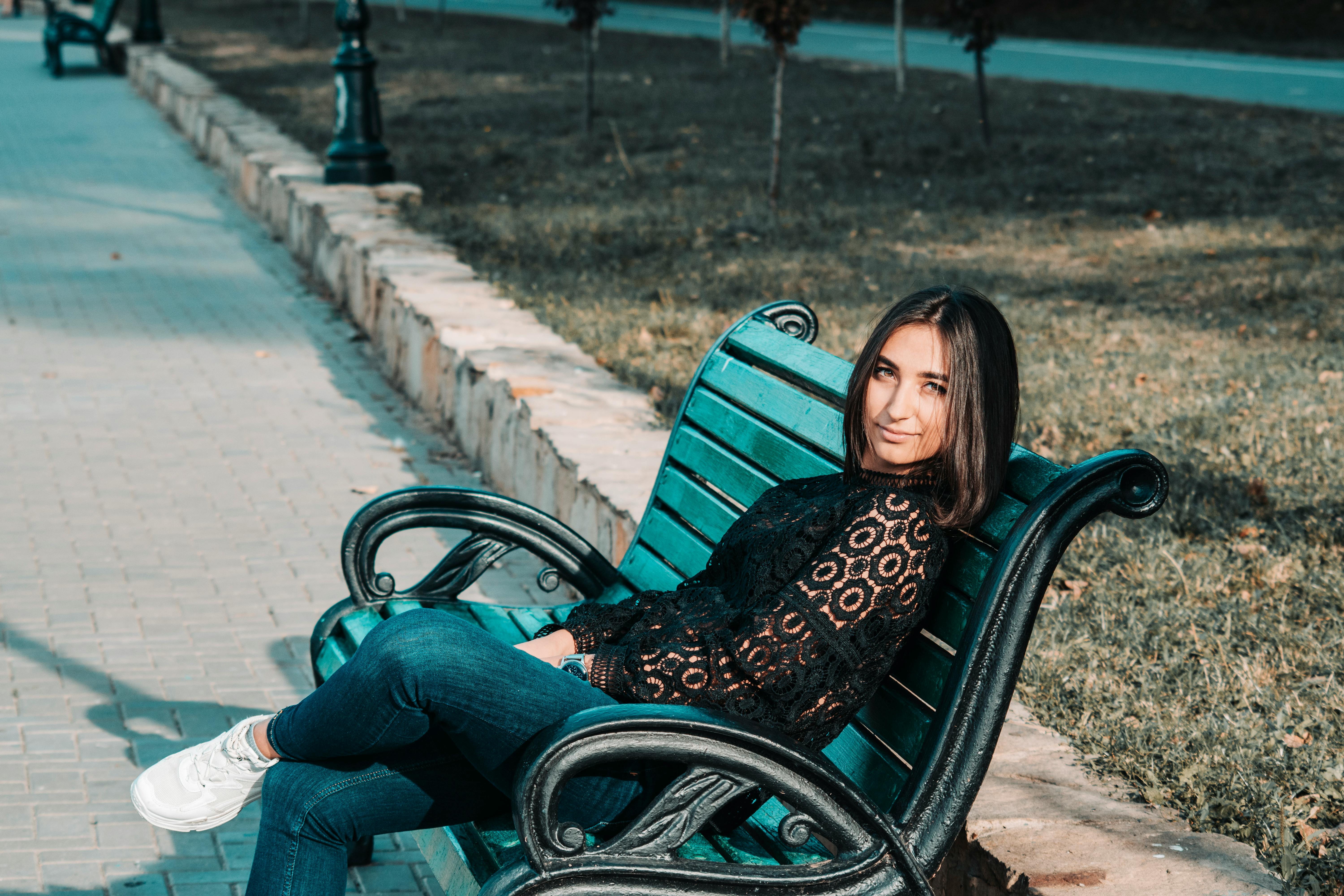 Woman Sitting on Bench · Free Stock Photo