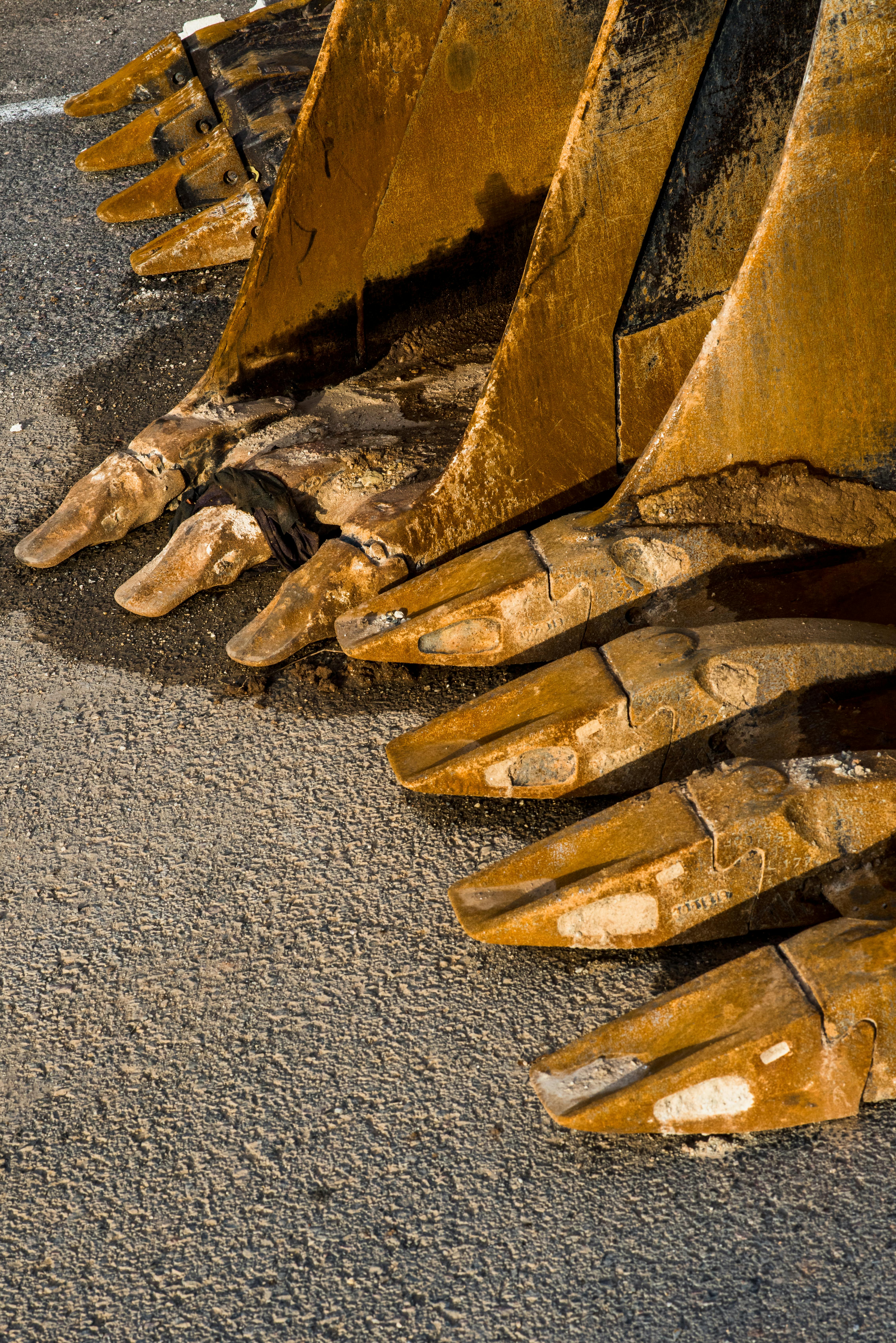 Close-Up of Rusted Construction Excavator Buckets · Free Stock Photo