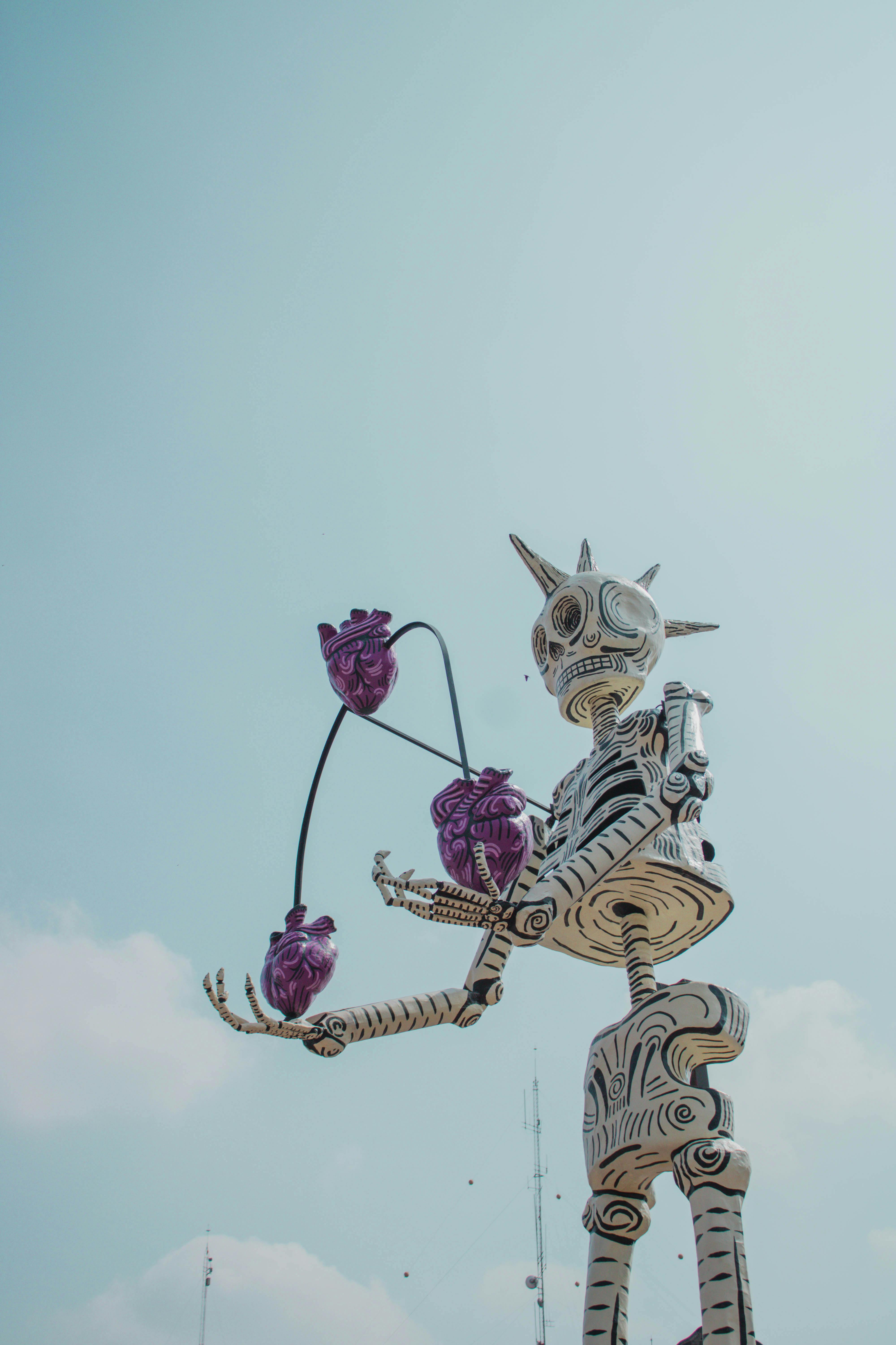 Day of the Dead Skeleton Sculpture Juggling Hearts · Free Stock Photo