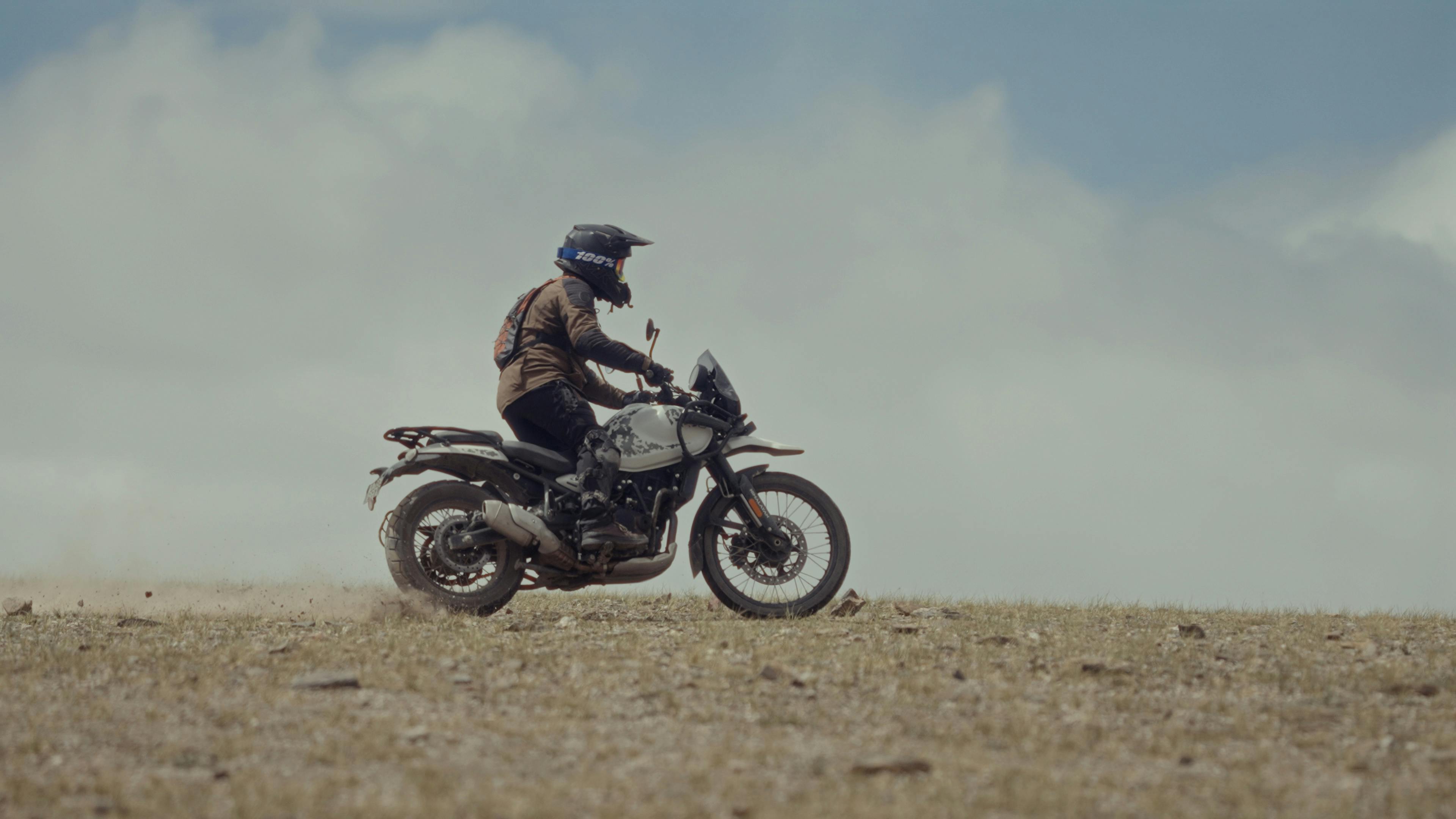Adventure Motorcycle Ride on Open Field · Free Stock Photo
