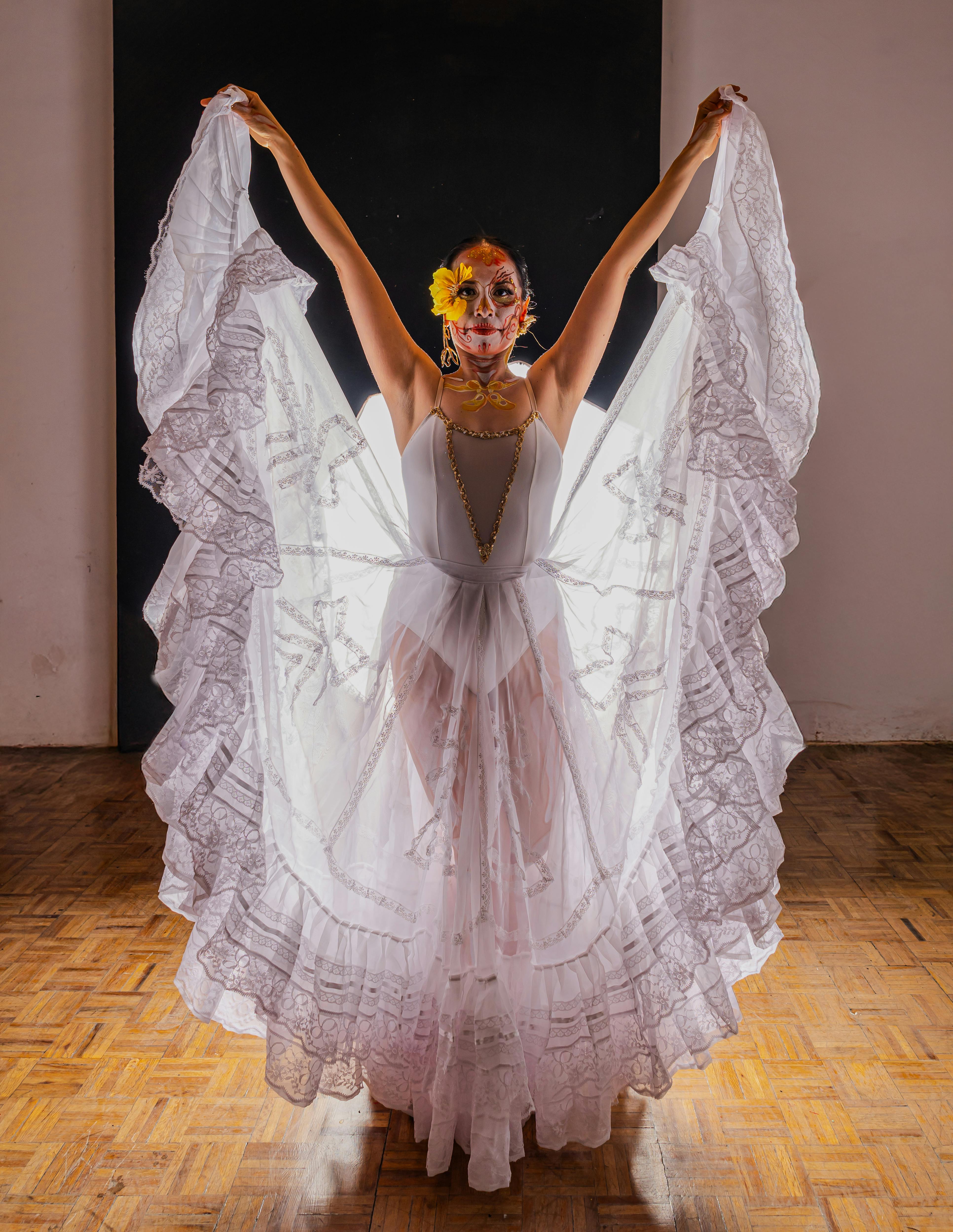 Elegant Mexican Ballet Dancer in Traditional Dress · Free Stock Photo