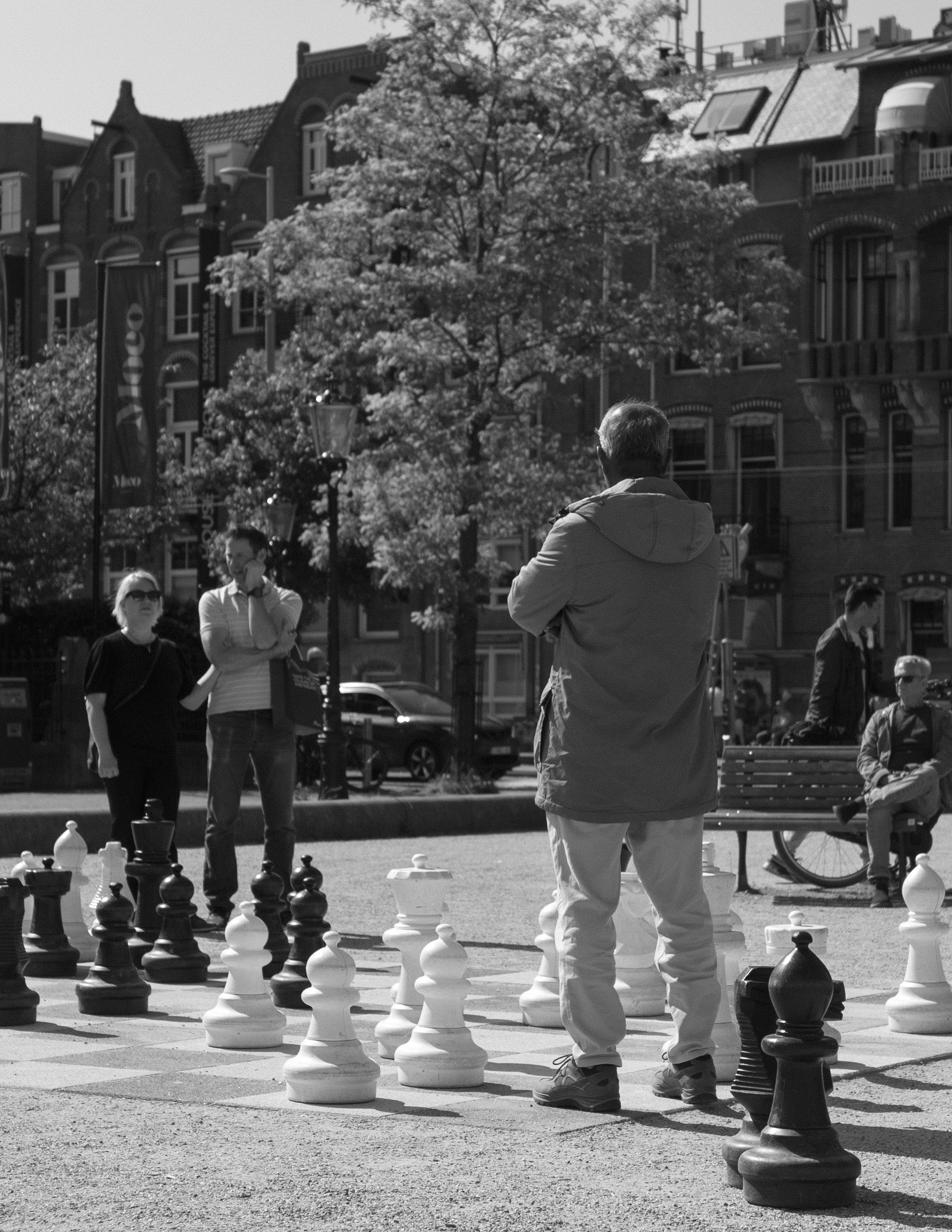 Outdoor Chess Game in Urban Park Setting · Free Stock Photo
